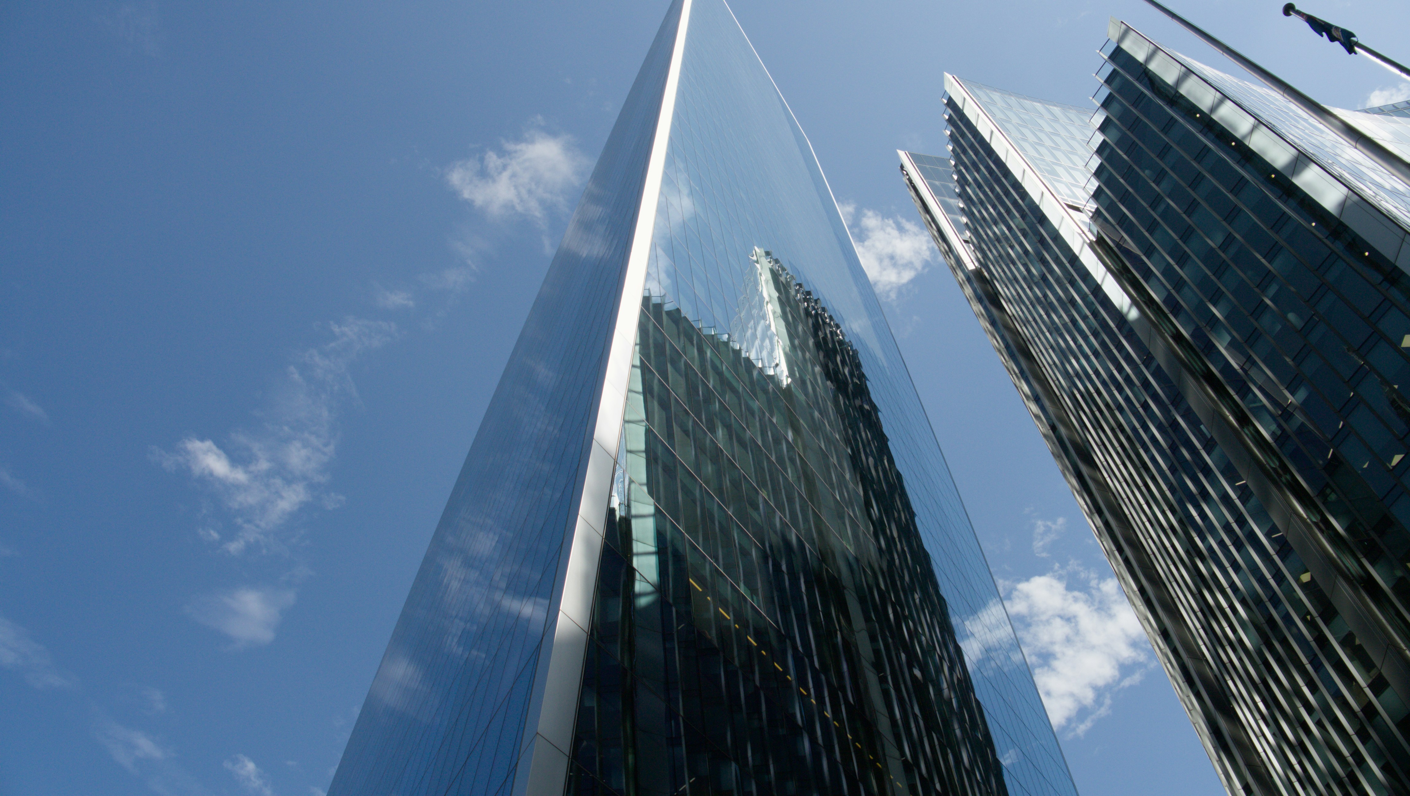 Glass Spire Duo: A Skyward Veil Between Towers