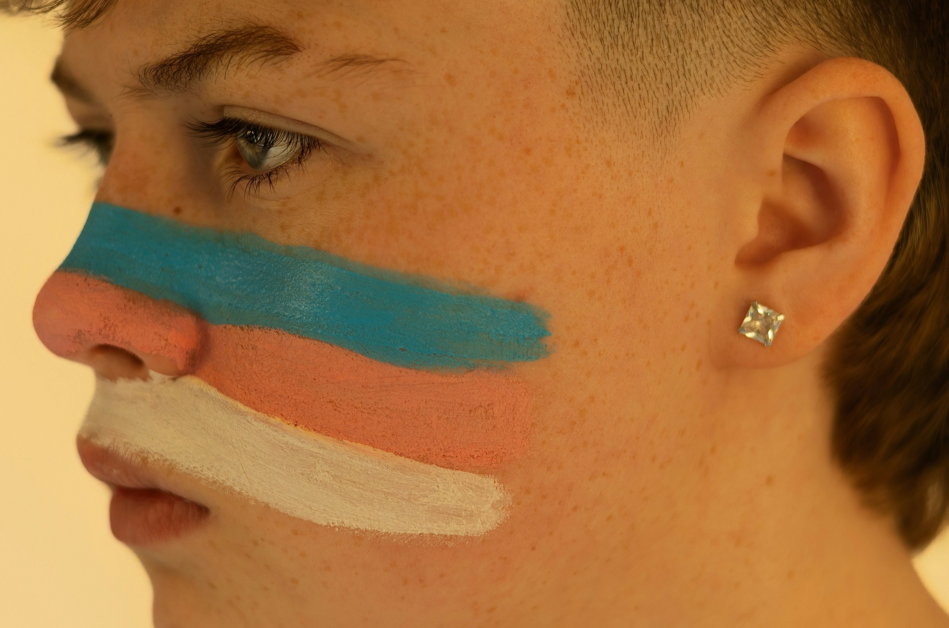 Painted Stripes: A Side Portrait with Color Markings
