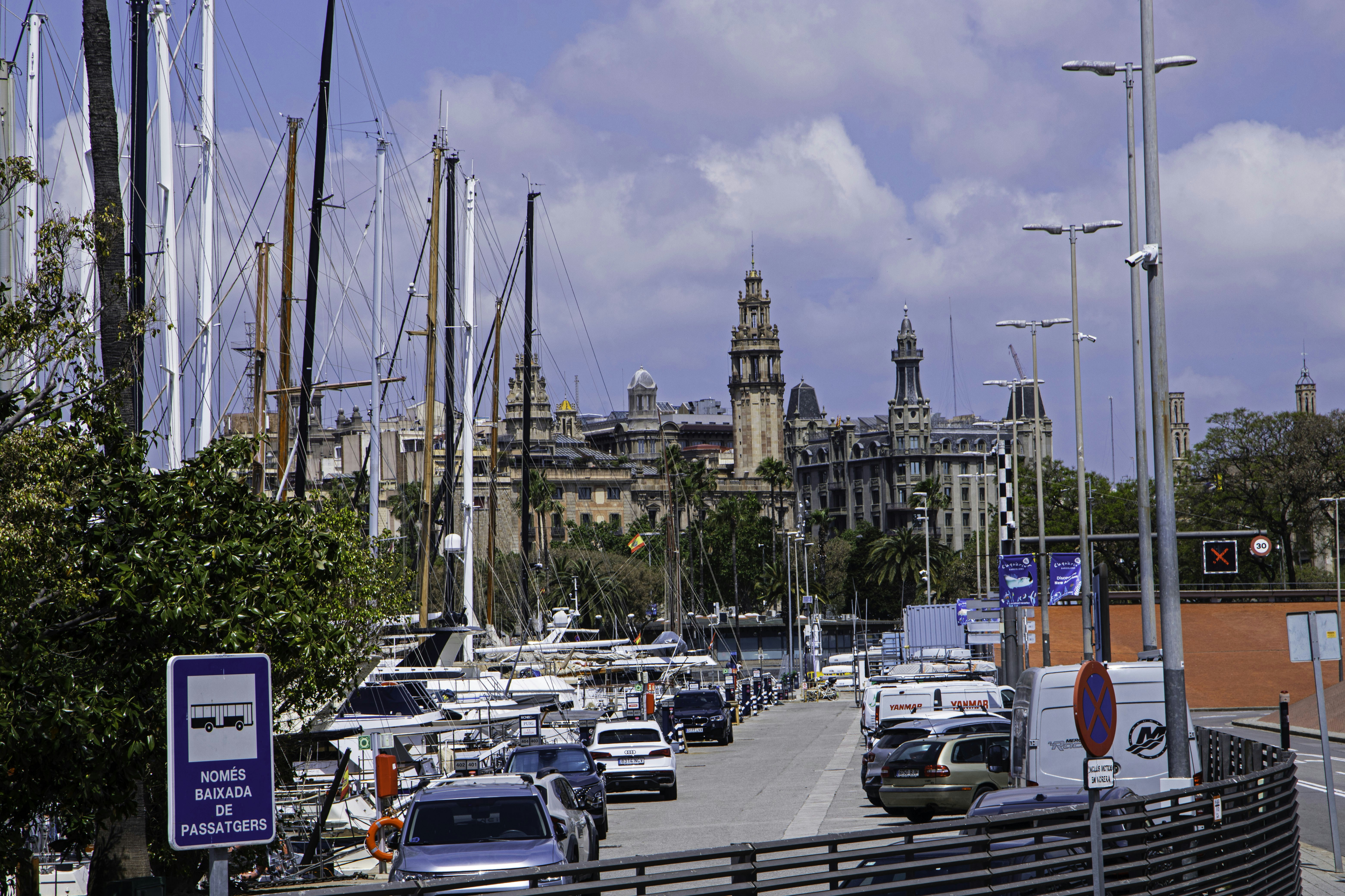 Harbor Street Serenade: Boats, traffic, and a skyline of historic towers