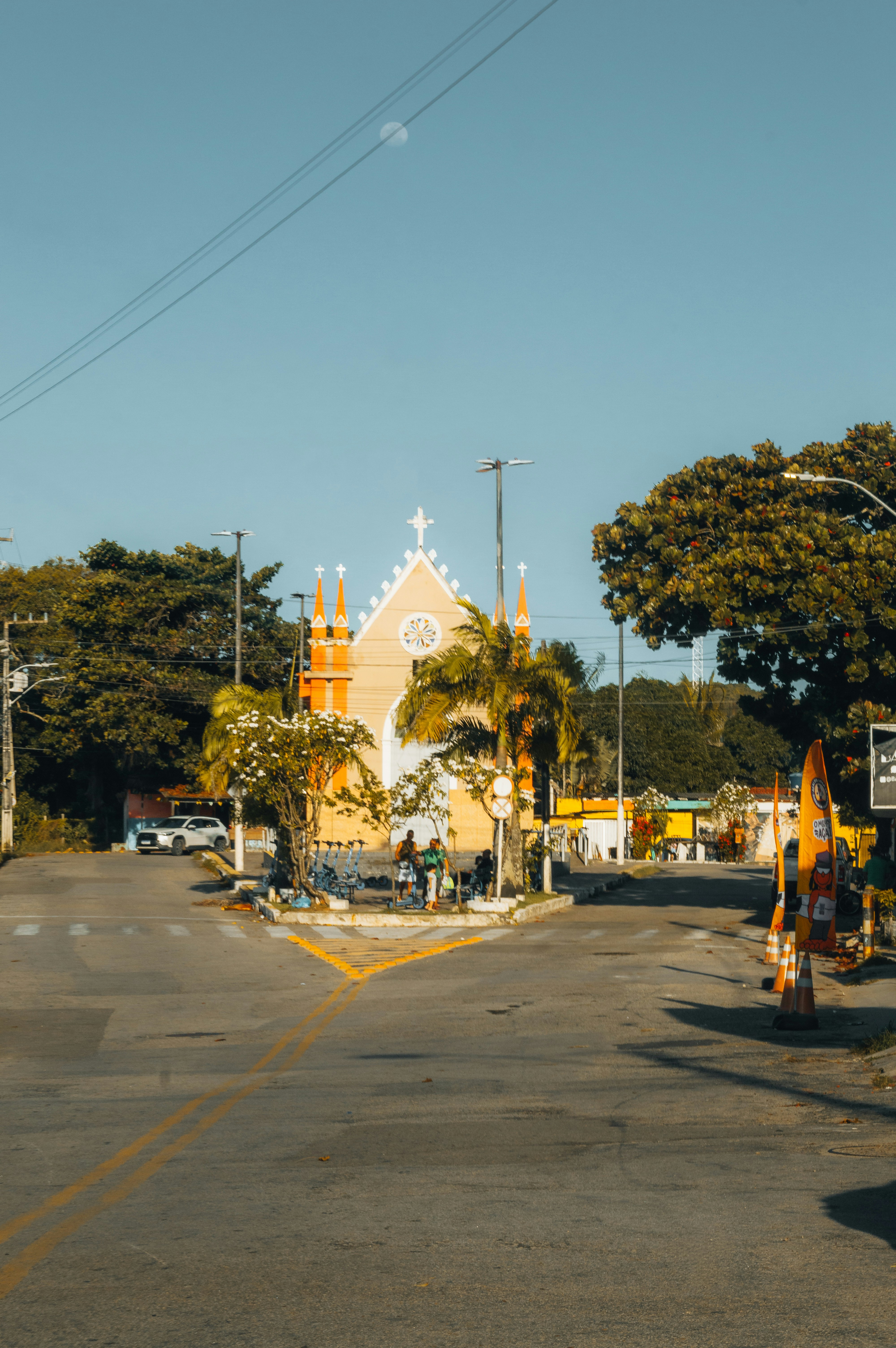 Sunlit Chapel at the Crossroads