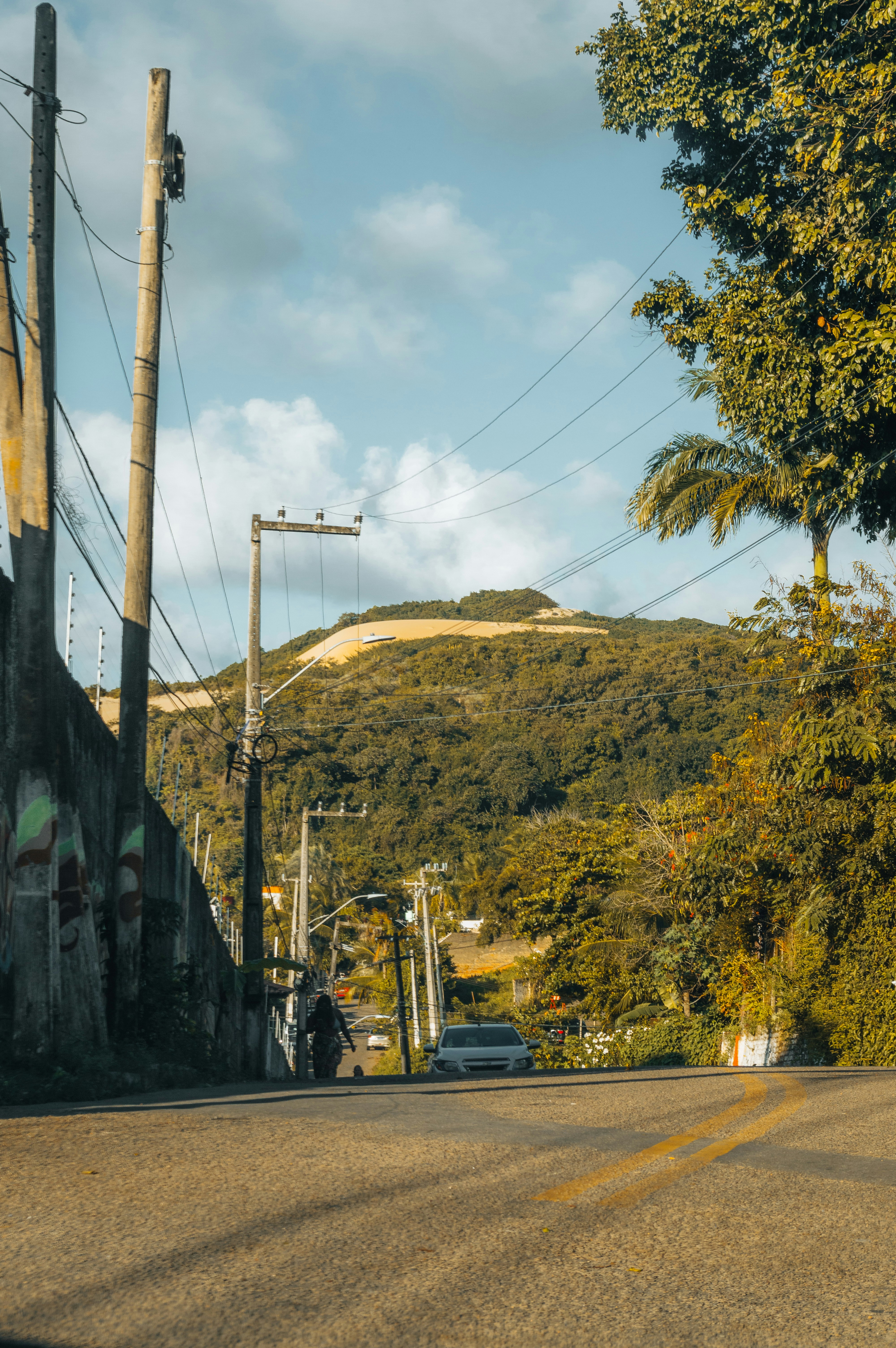 Rural Street Descending Toward a Quiet Horizon