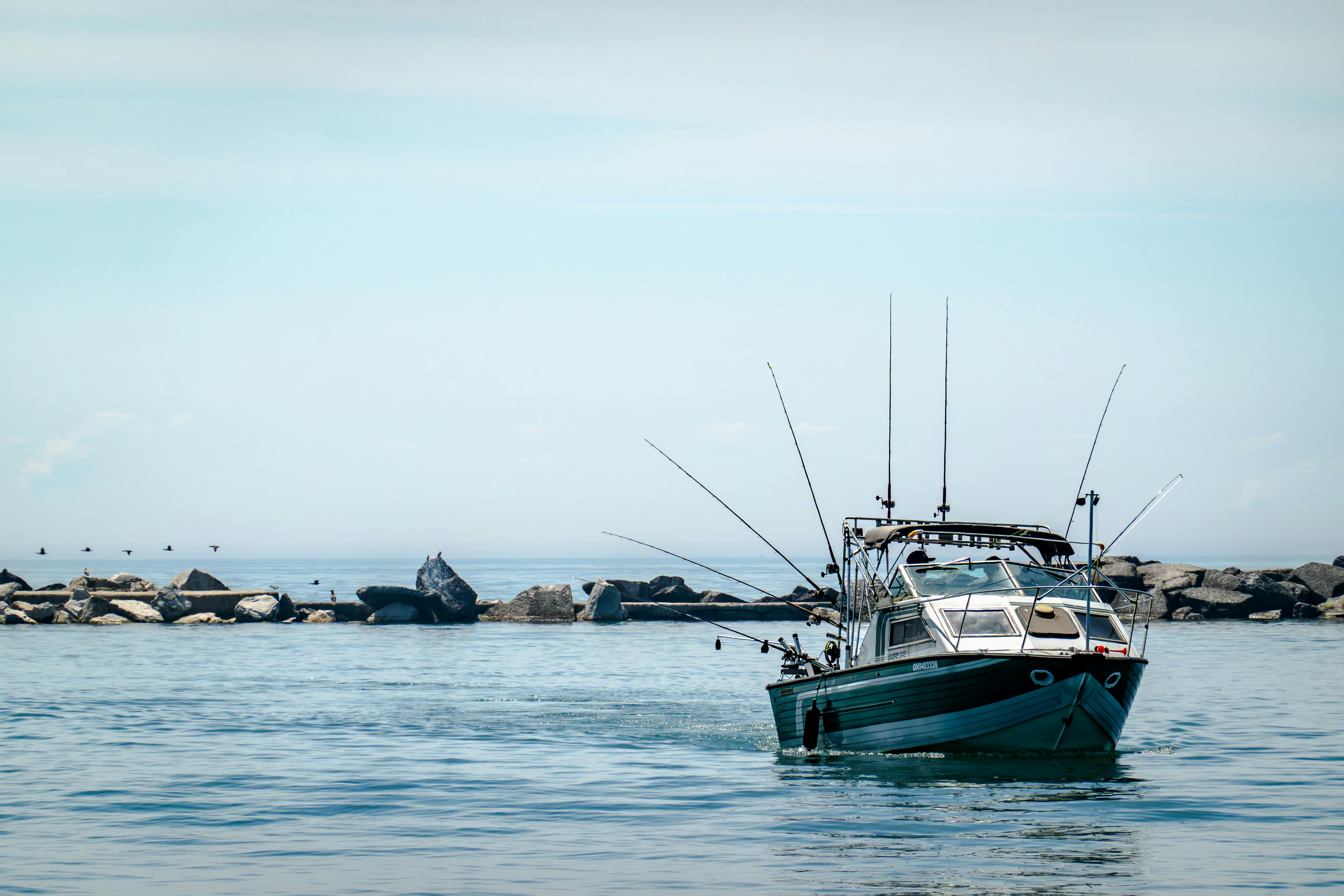 a fishing boat coming into harbor