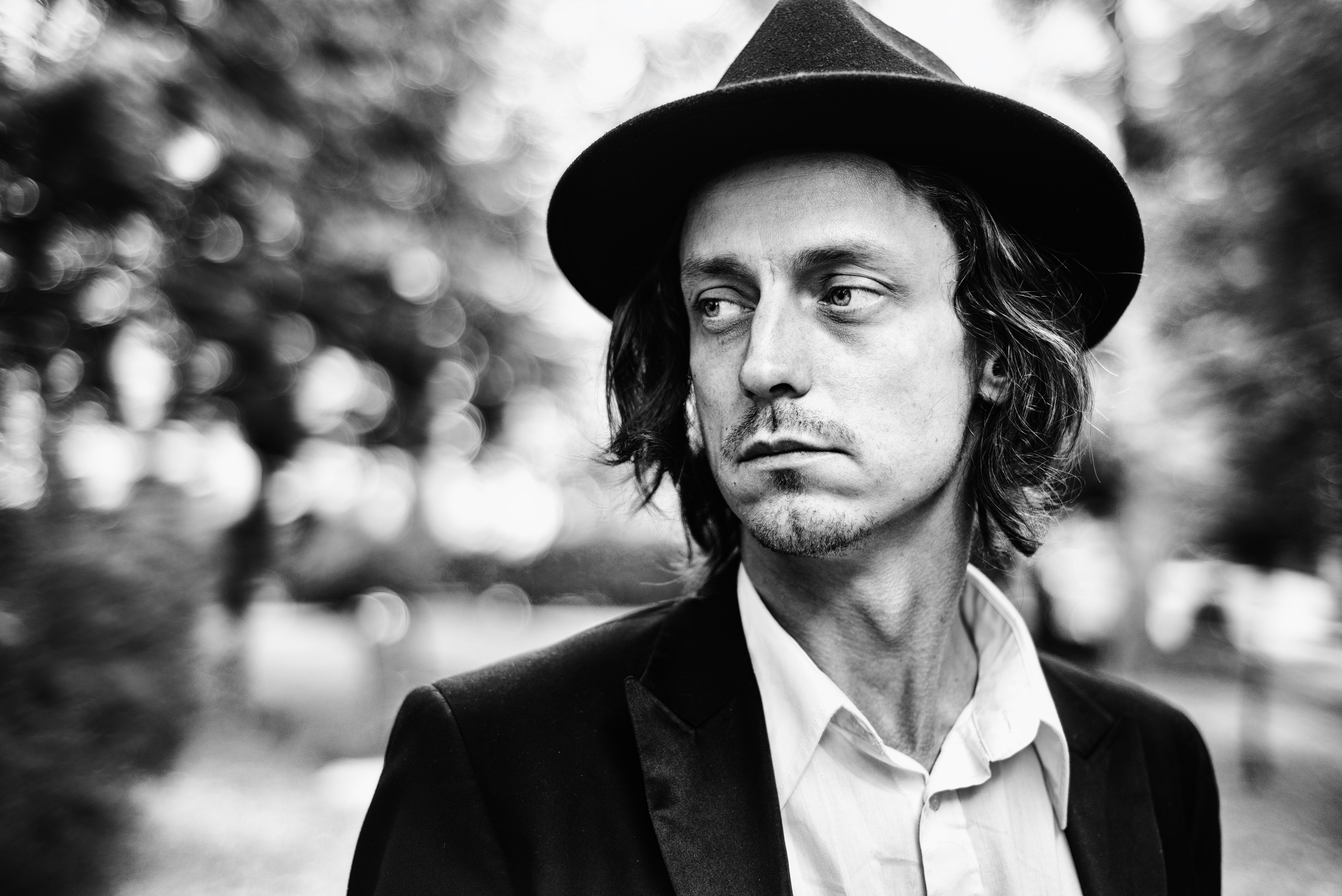 Portrait in Profile: A Subtle Gaze Beneath the Hat