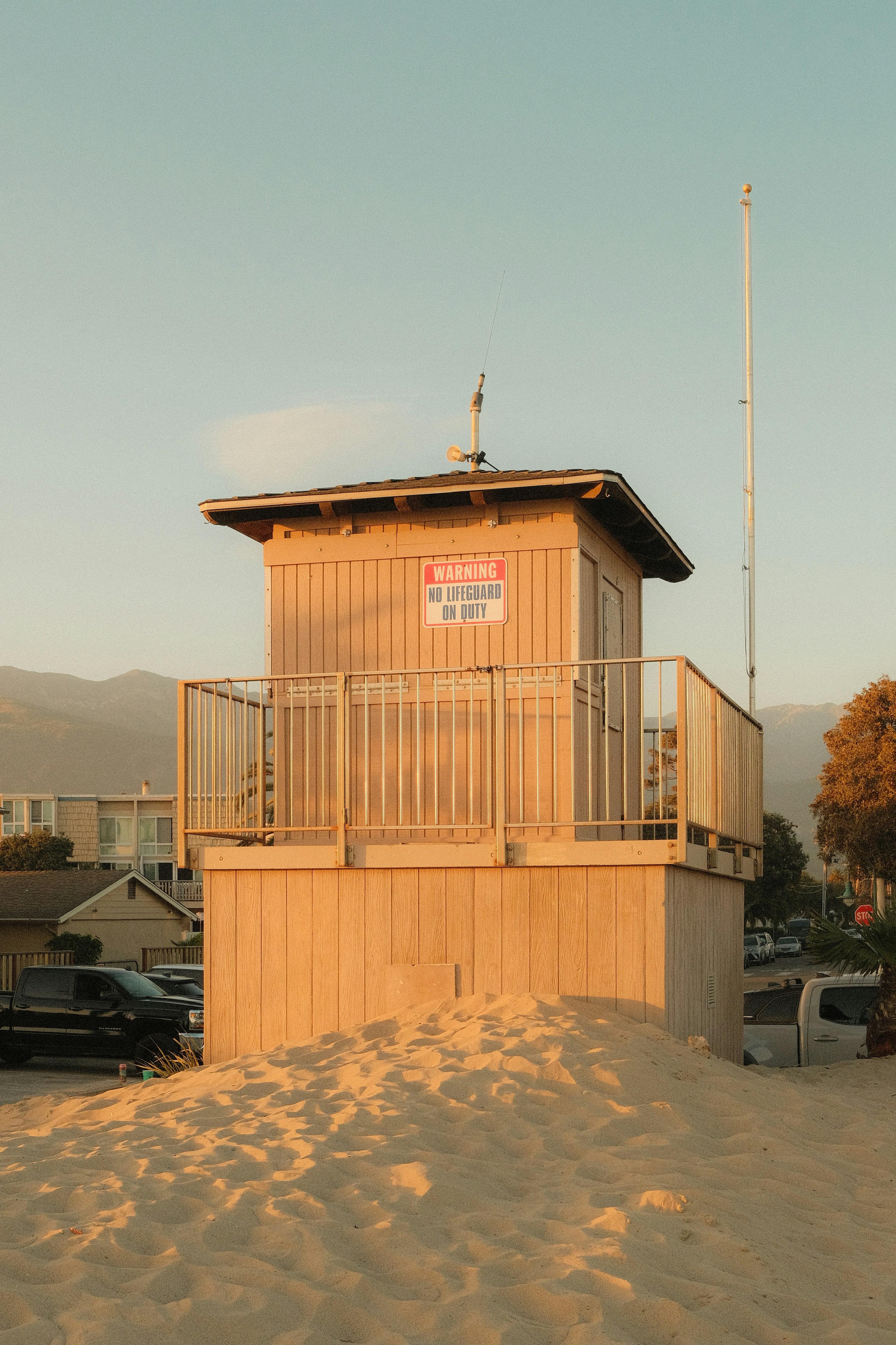 Lifeguard’s Haven: Sunset Sand and Watchful Tower
