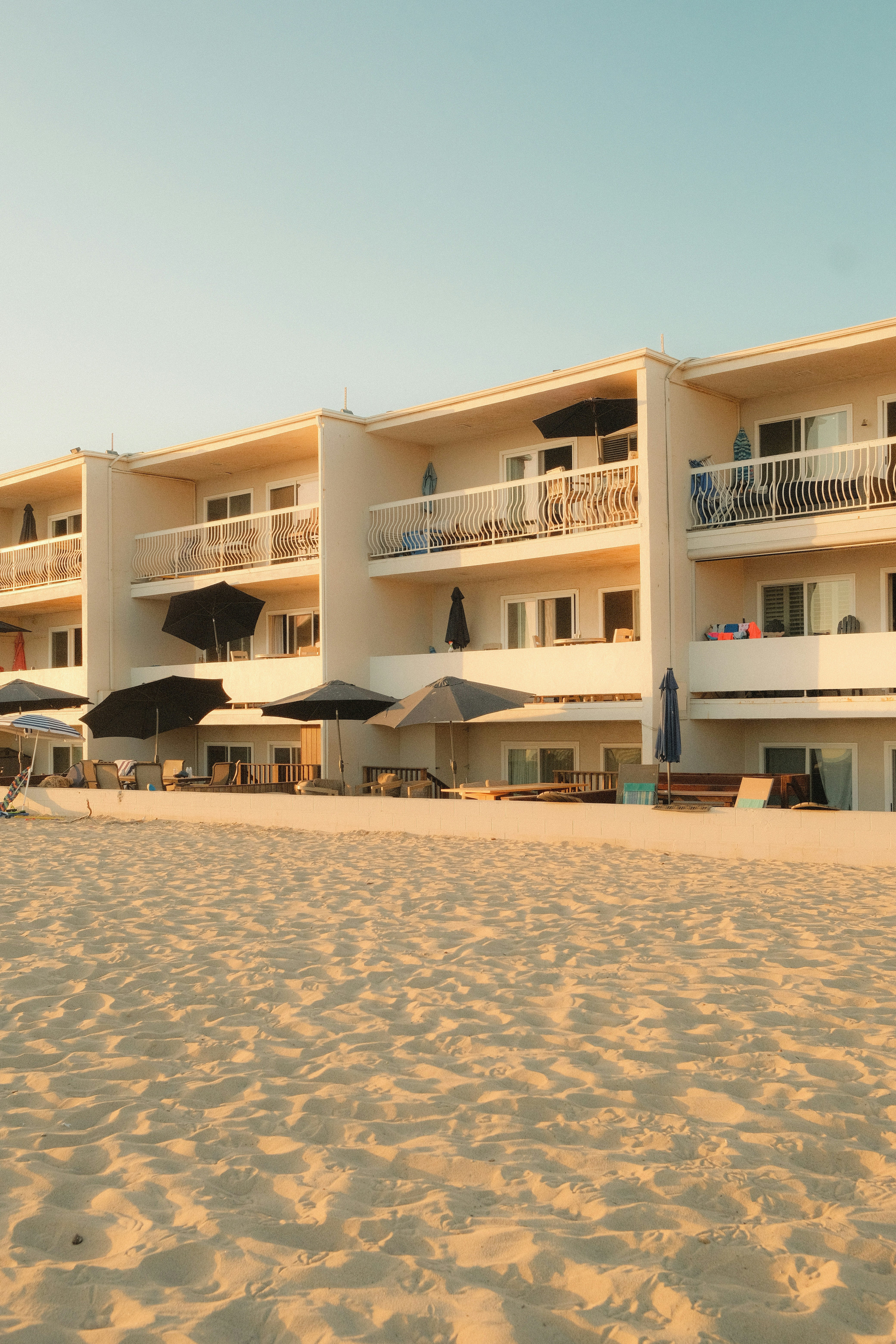 Beachfront Residence: Quiet Morning Along the Sand and Balconies