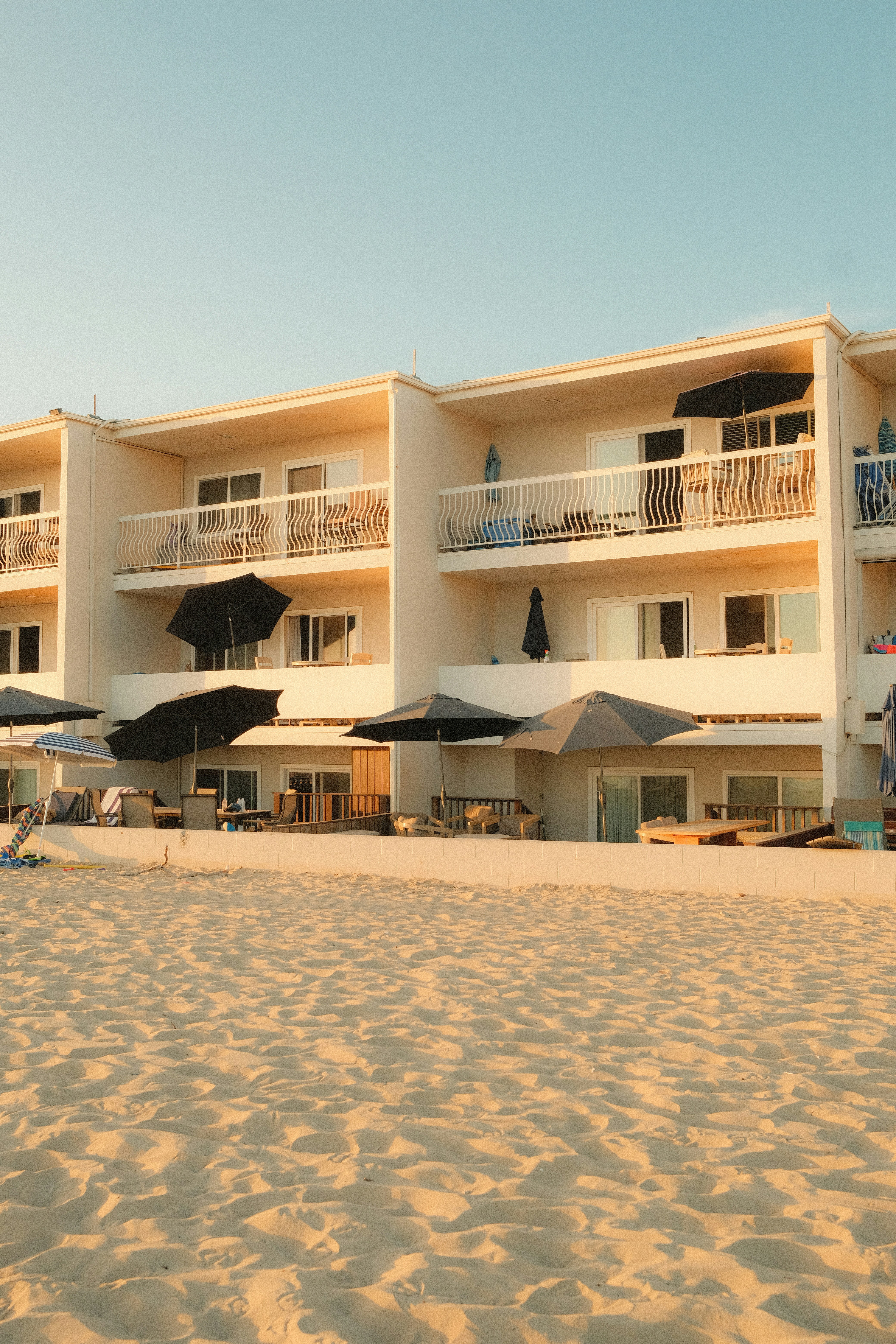 Beachfront Suites: Quiet Morning by the Oceanfront Balconies