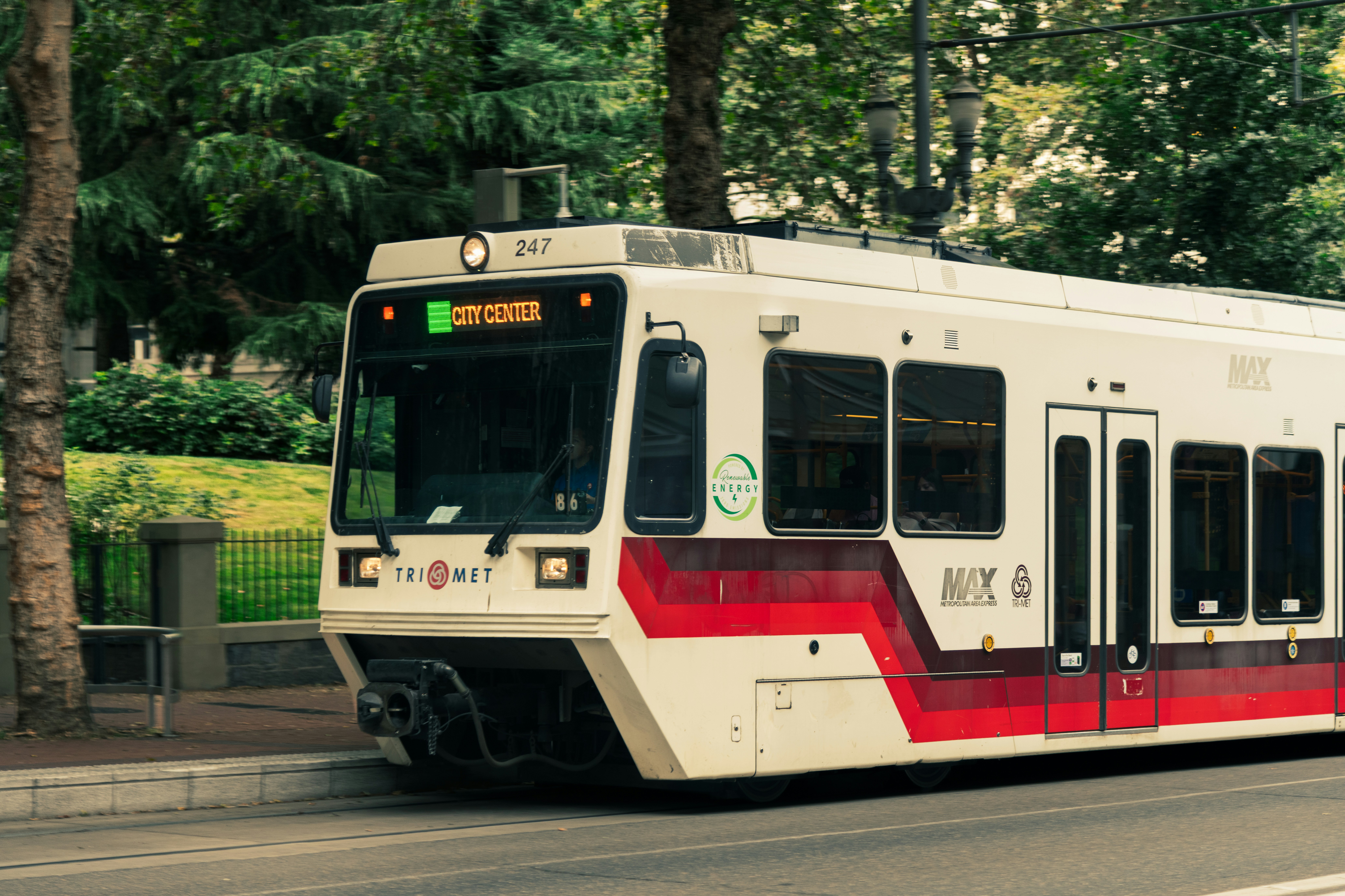 White City Tram Rounds the Corner in Quiet Park