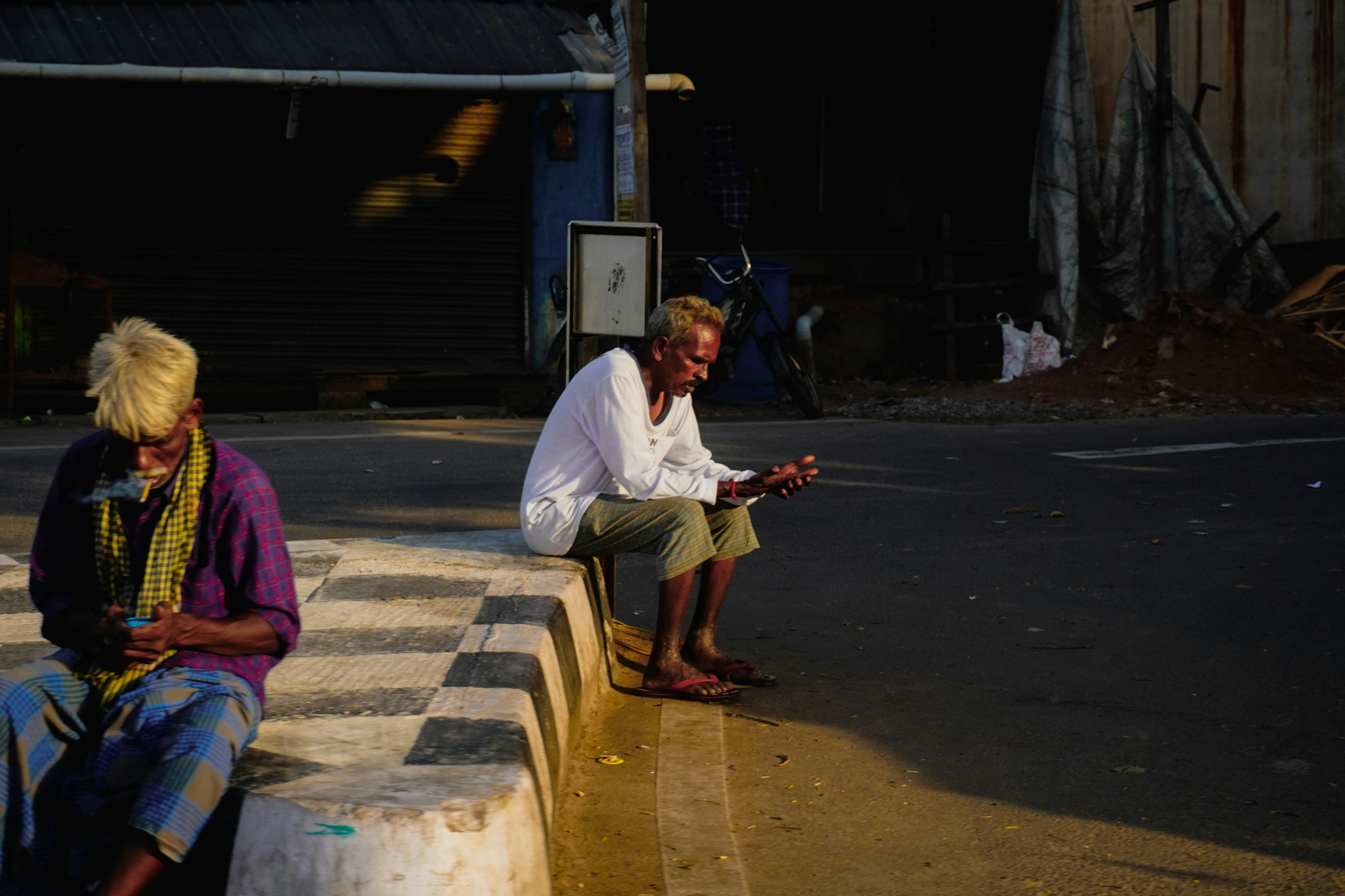 Two Strangers, One Quiet Street: Faces in the Shadows