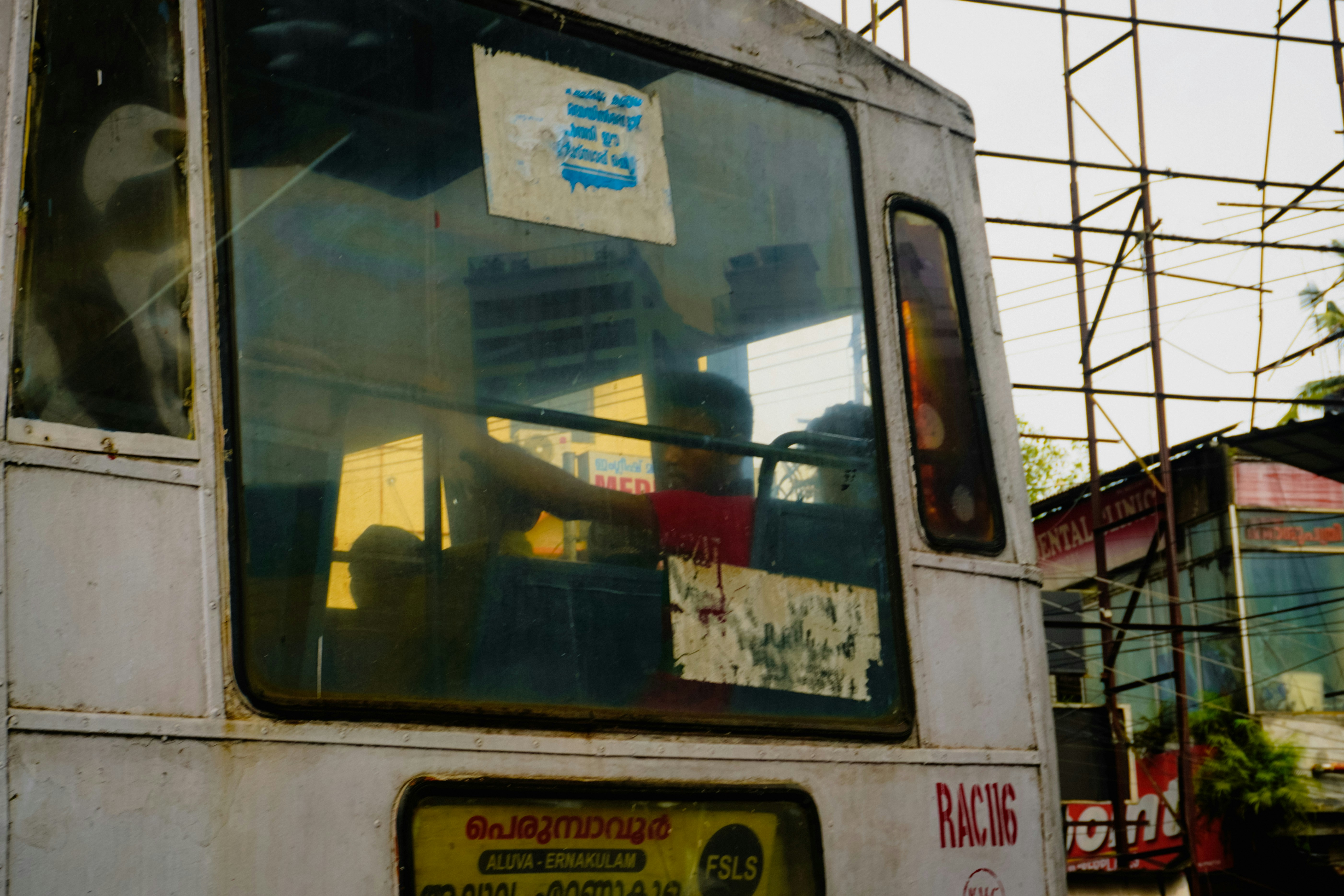Masked in Bus Windows: A Static Portrait of a Public Transit Front