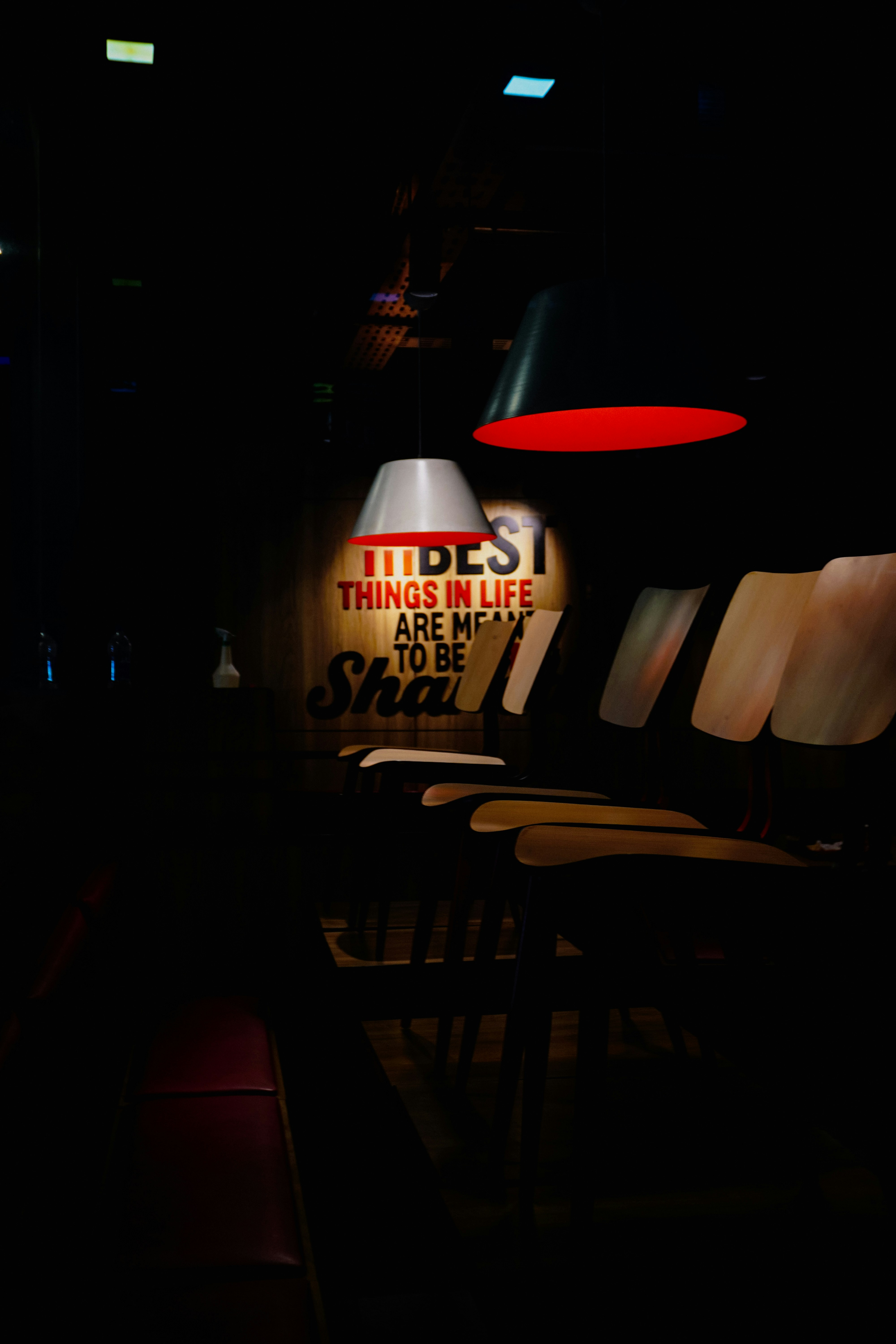 Lone Lamp Illuminates a Quiet Café Moment