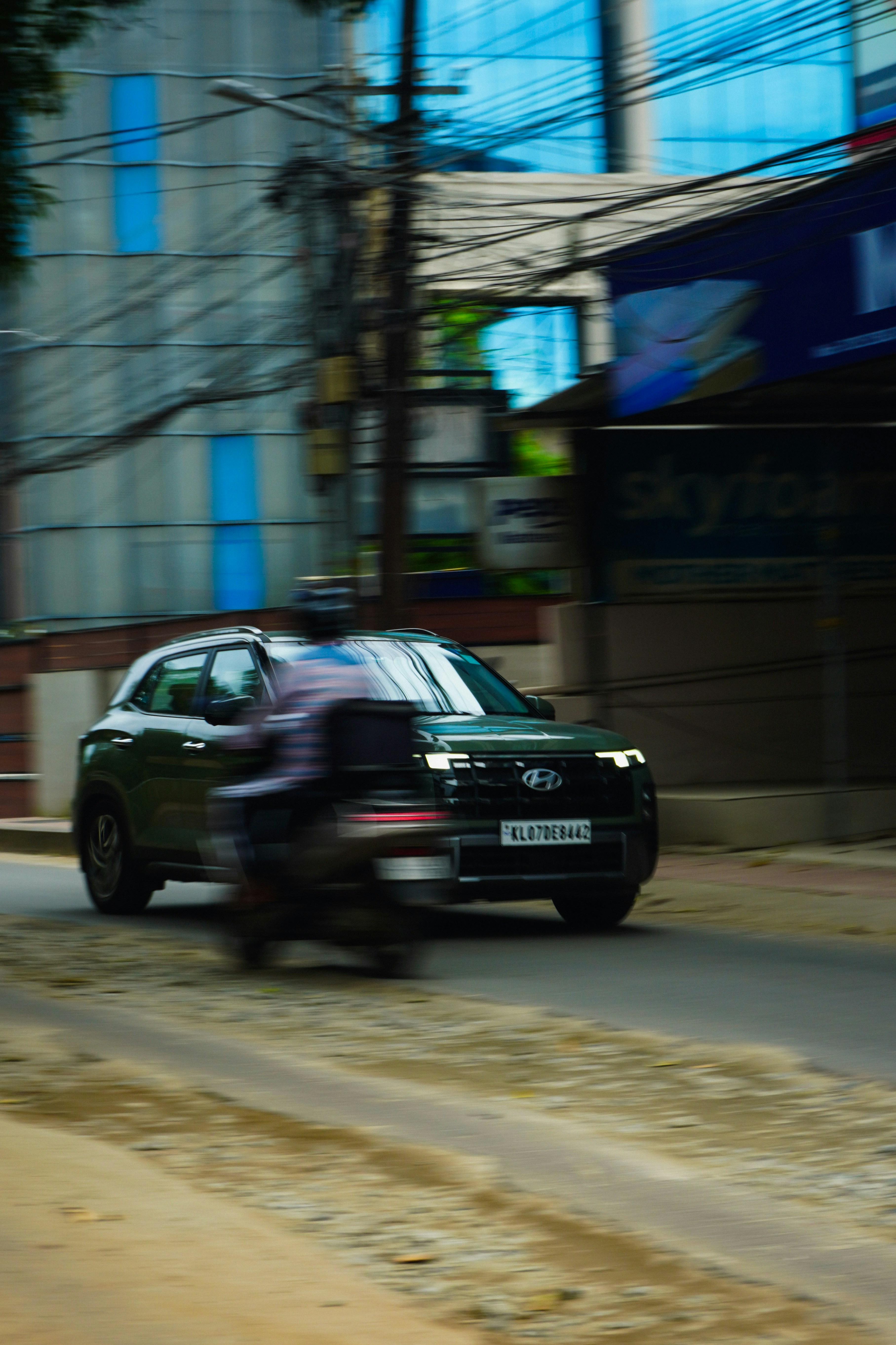 Blurry Street Move: A Hyundai in Motion