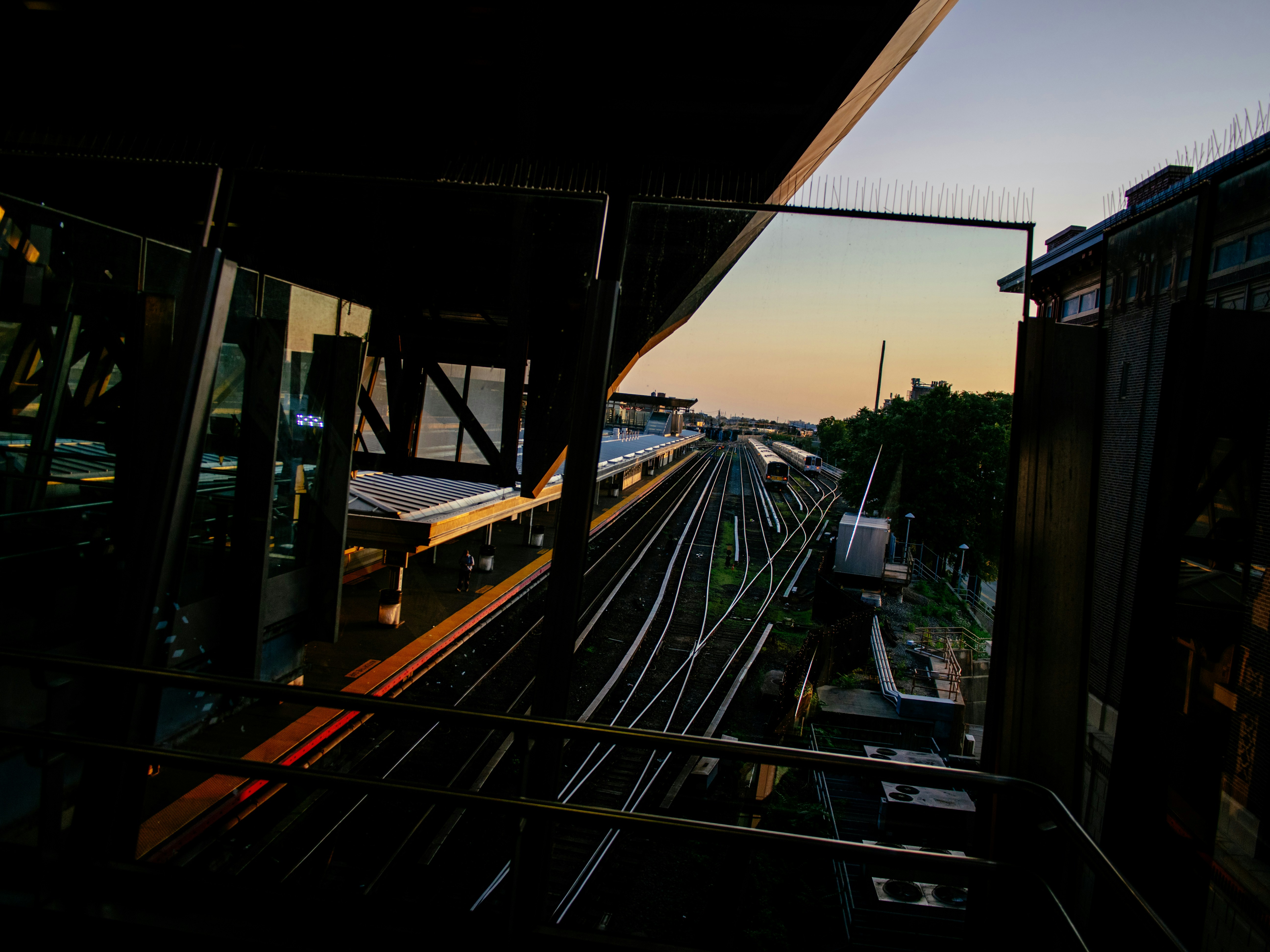 Rising Rails: sunset over a converging urban spine
