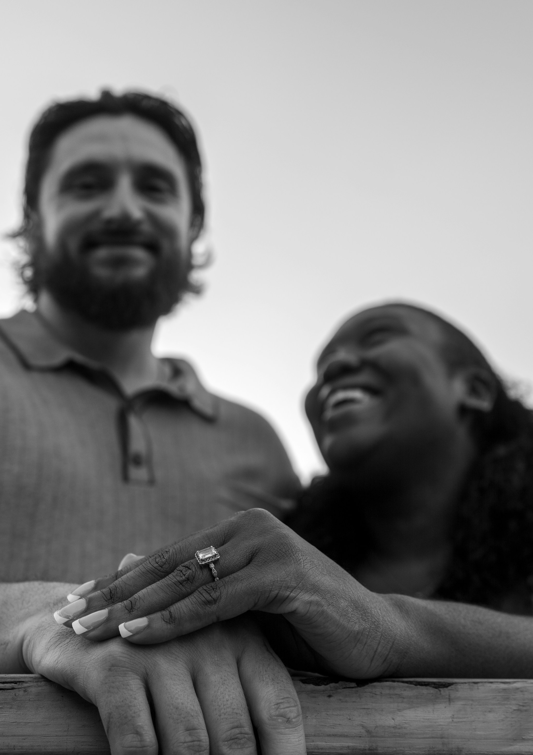 Elegant Proposal: A Close-Up of the Ring in Shared Joy