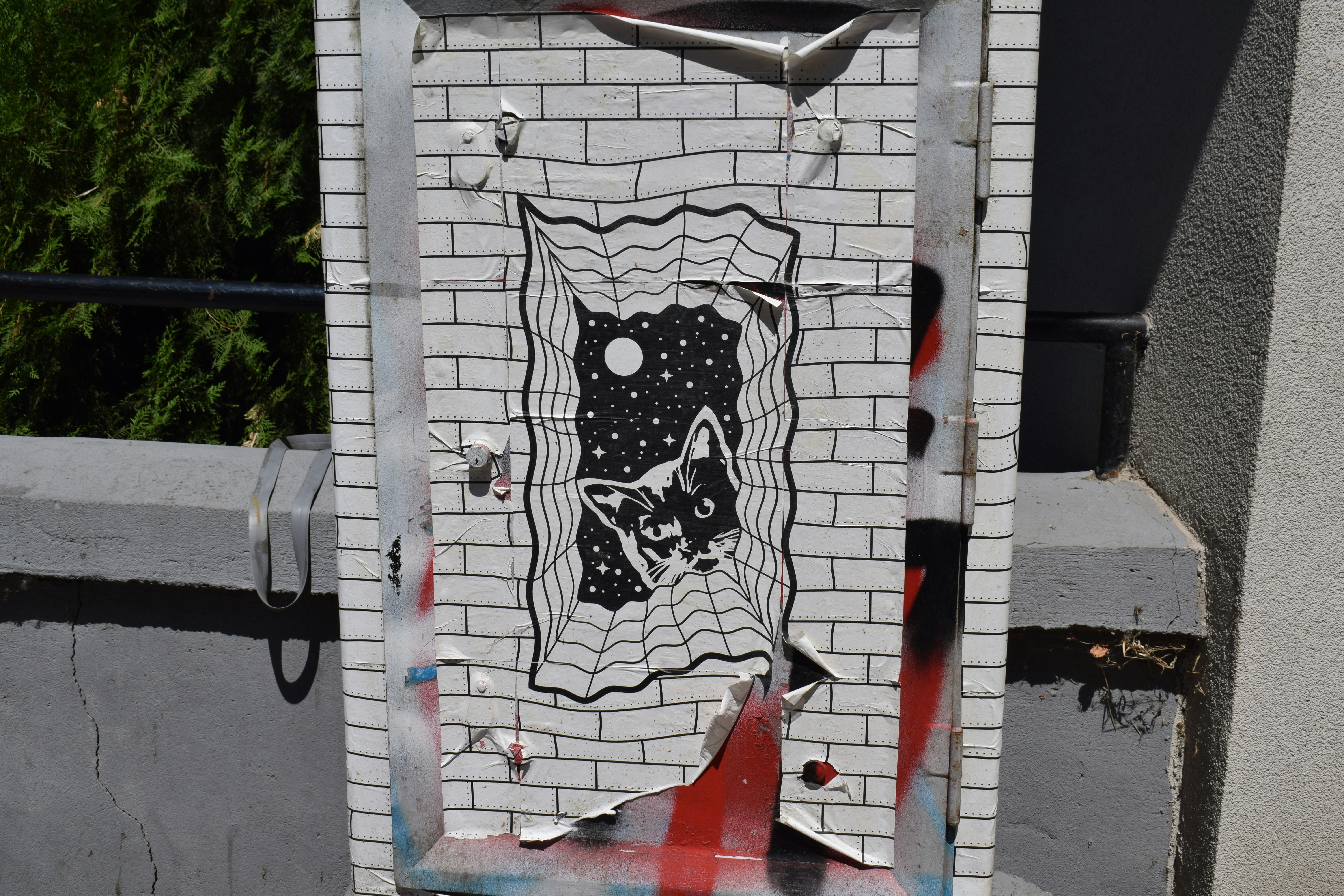 Stenciled Moonlit Cat on a Graffiti Panel