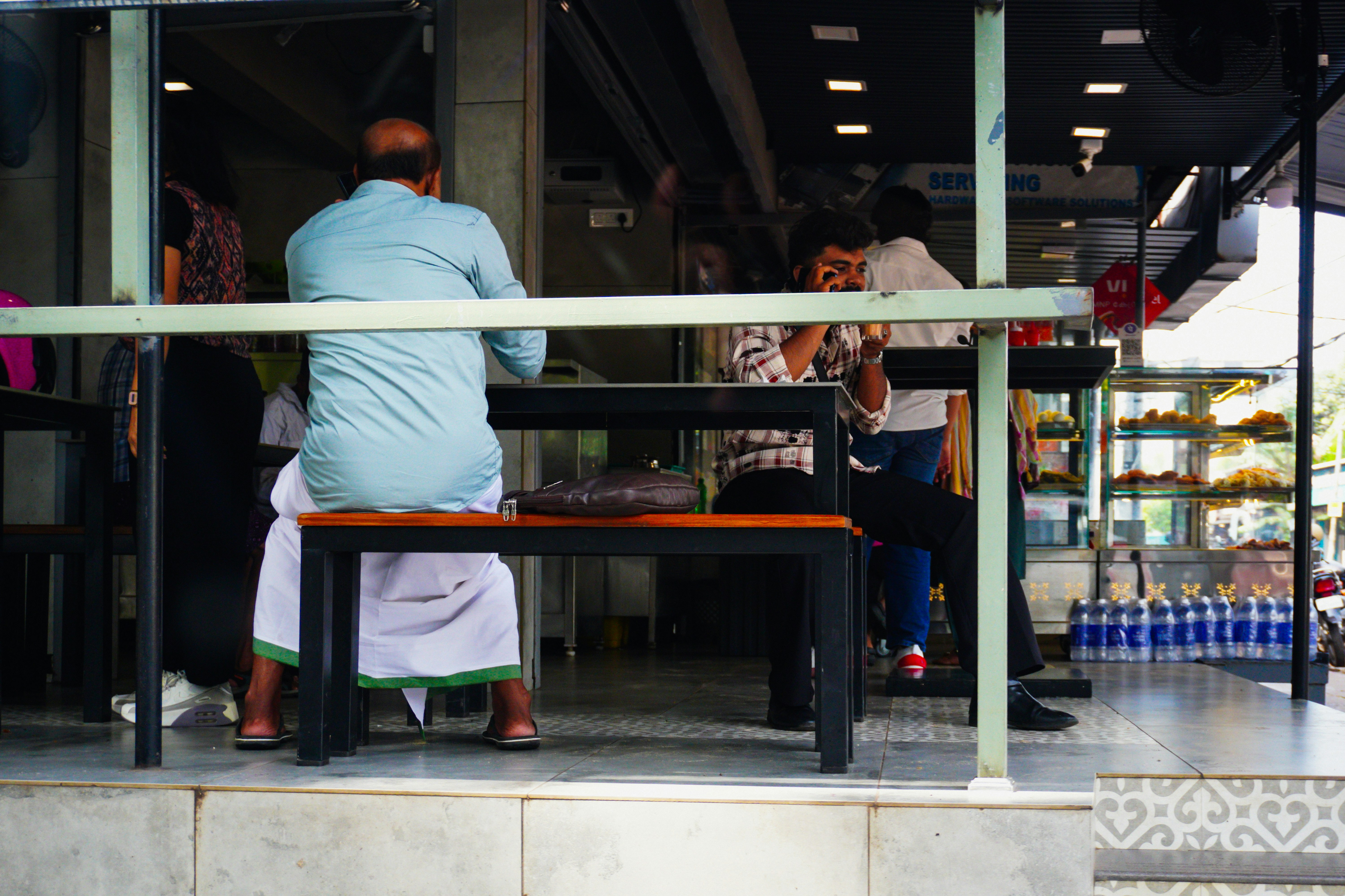 Cafe Shelter: A Quiet Moment at the Front Bench