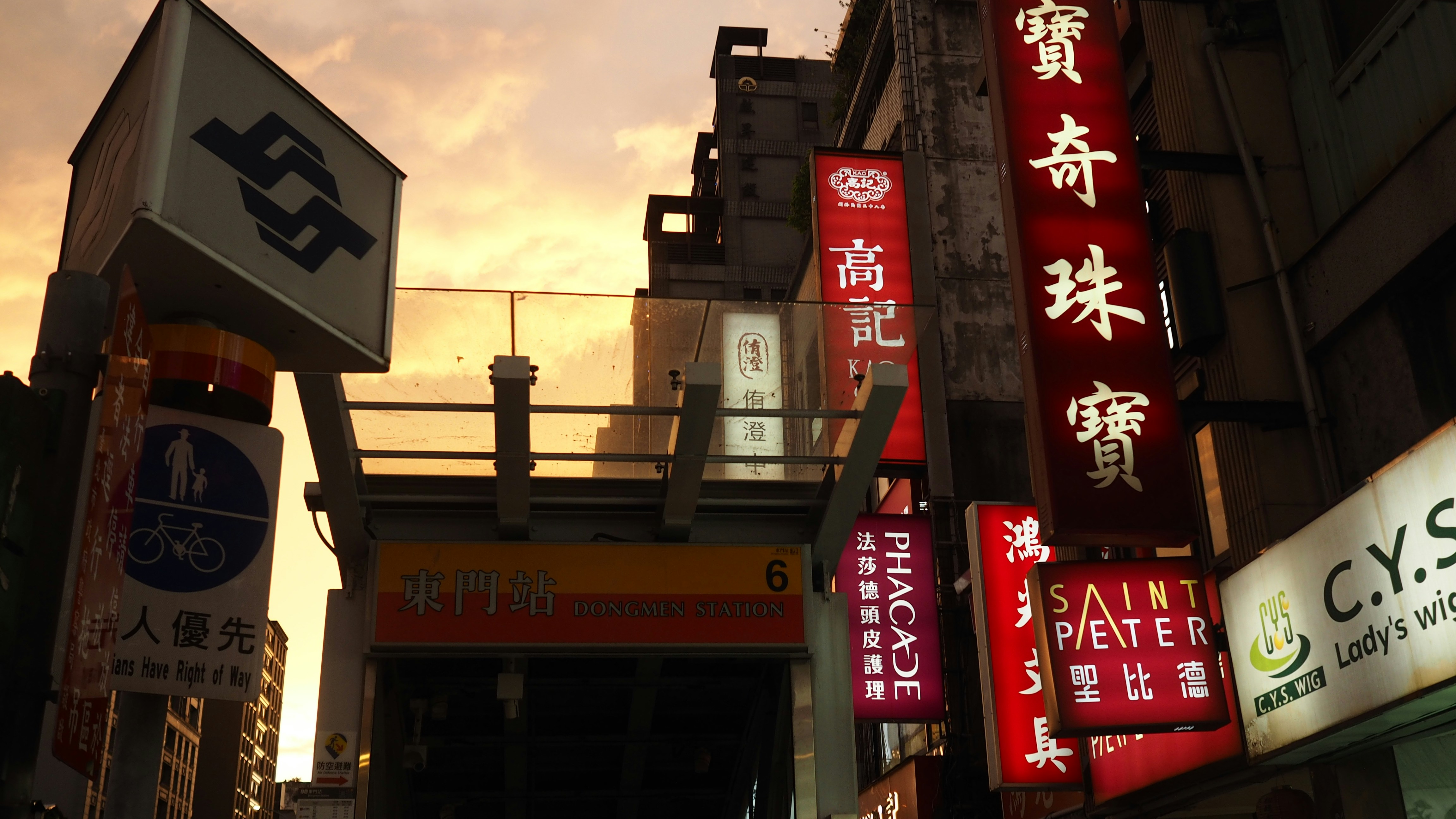 Neon Alleyways Under a Crimson Sunset