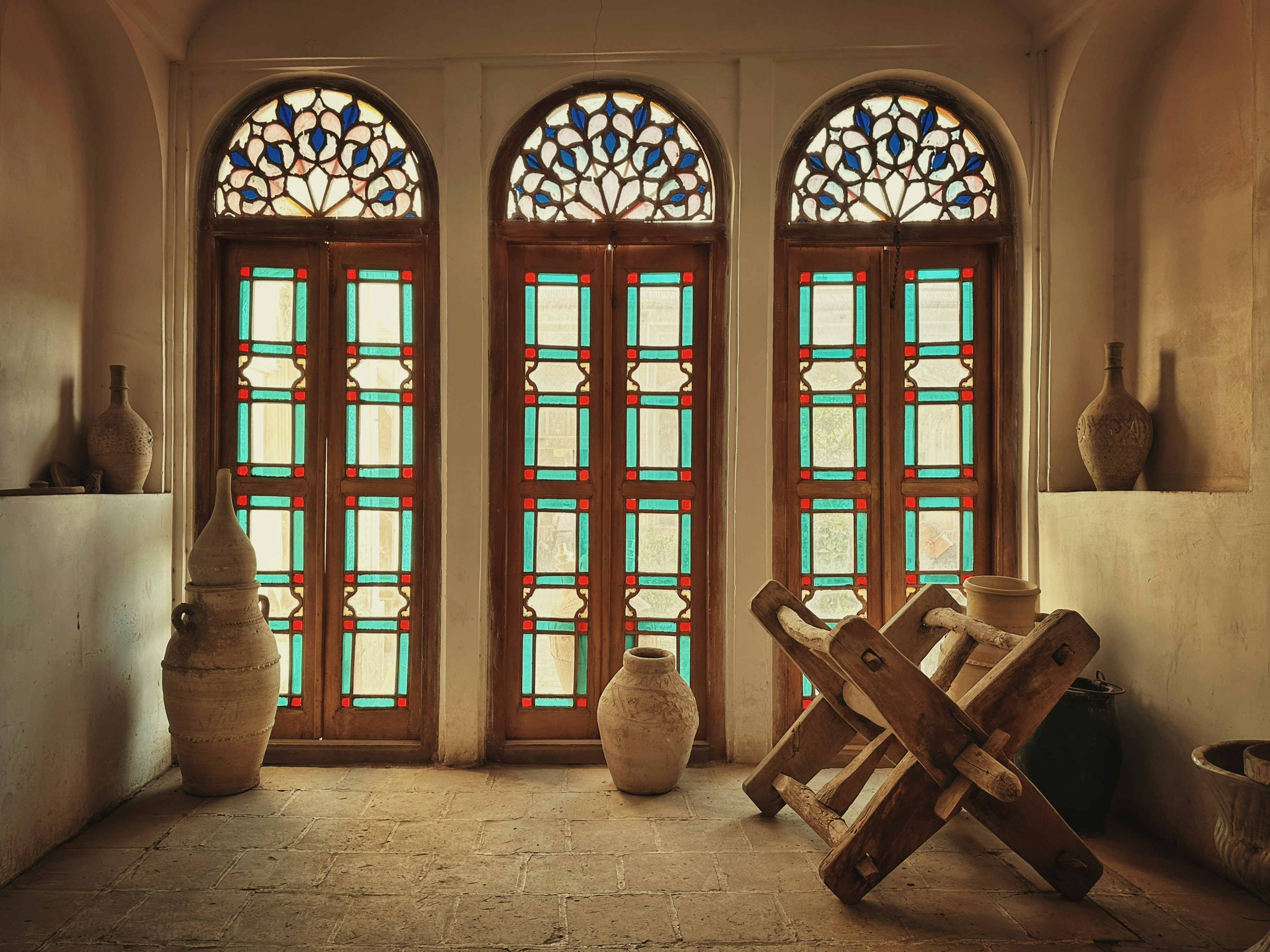 Stained Glass Reflections in a Quiet Gallery