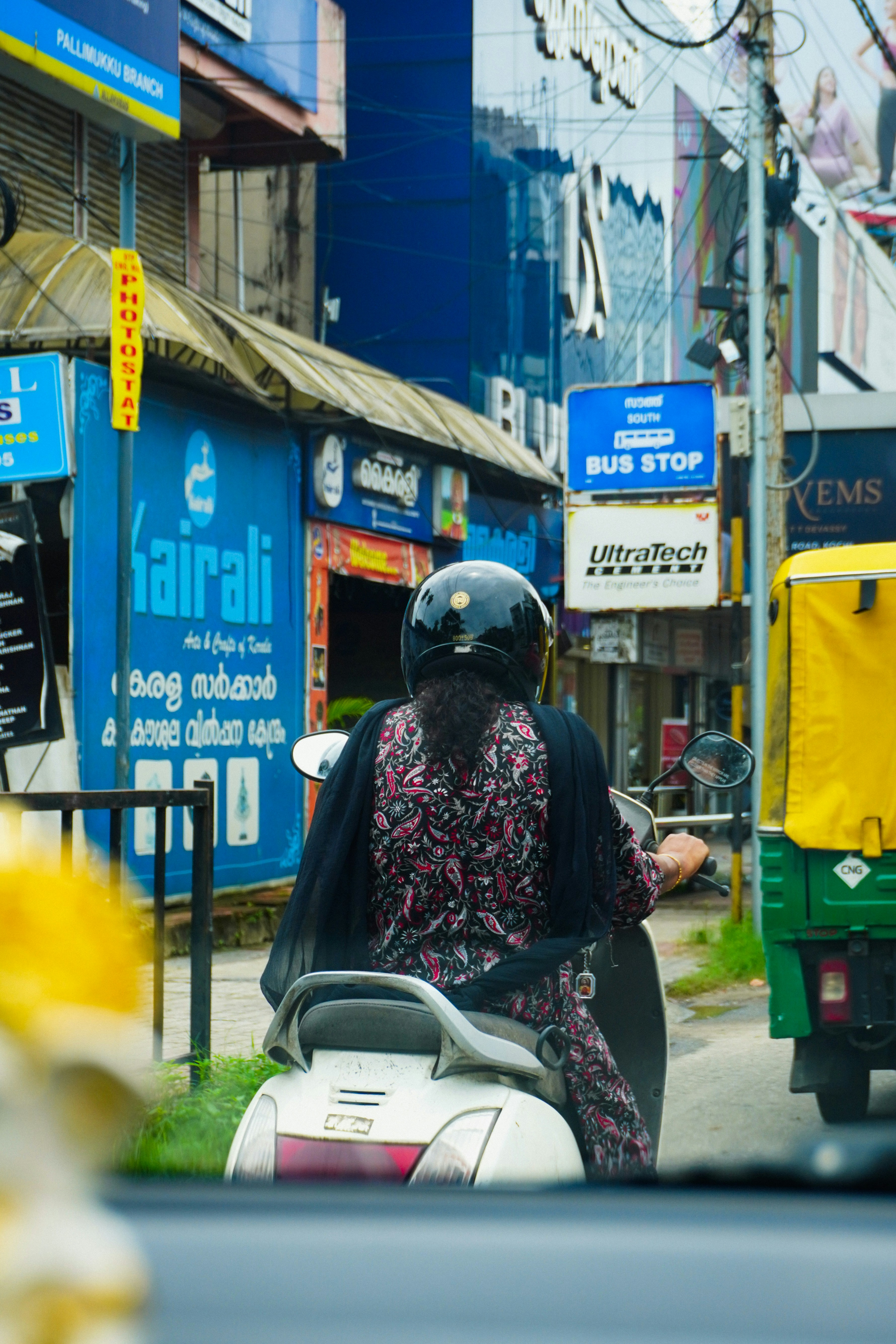 Rider in a Vibrant Urban Corridor
