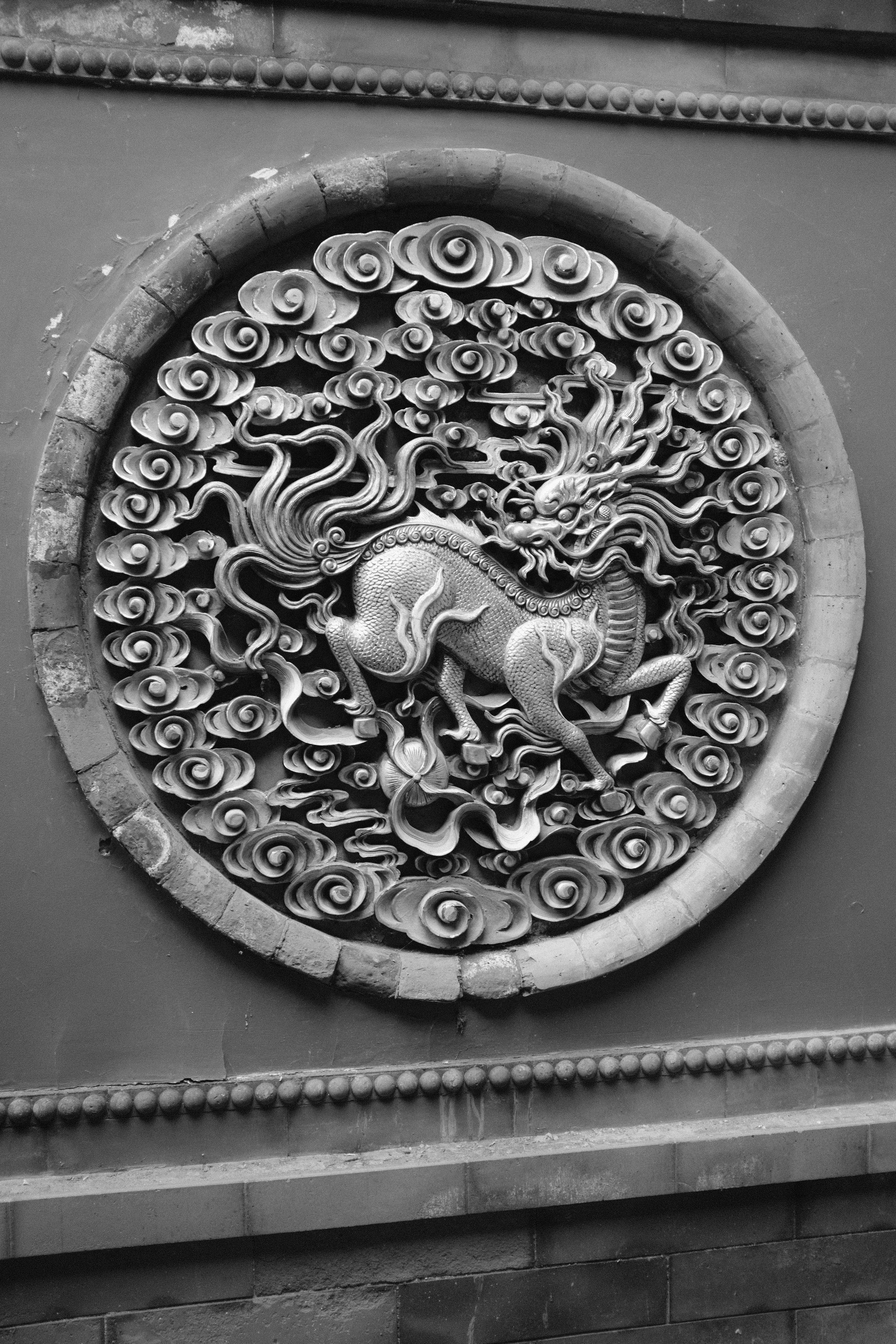 Celestial Dragon in a Stone Ring: A Silent Relief Sculpture