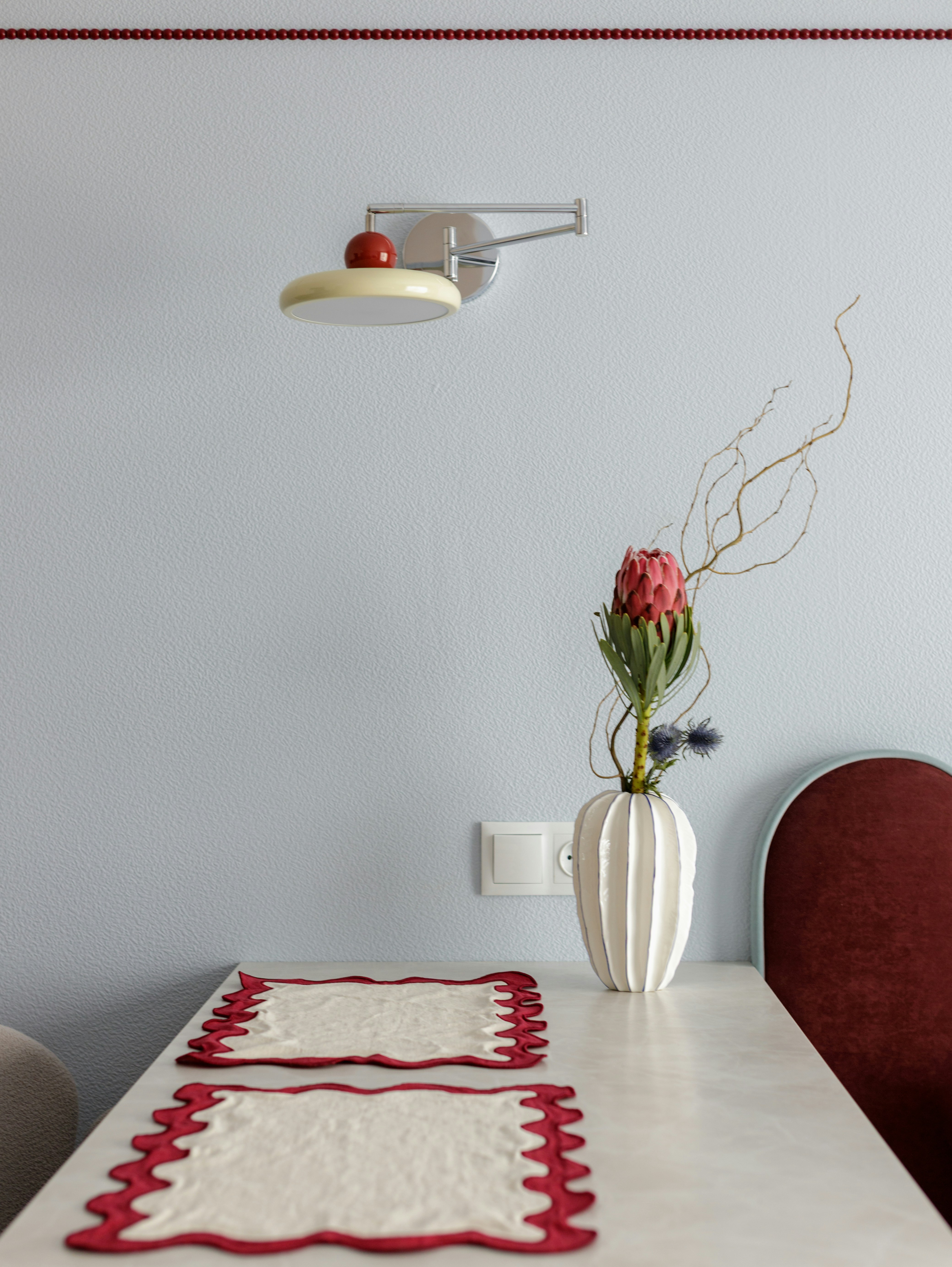 Minimalist Still-Life in Soft Light with Floral Accent