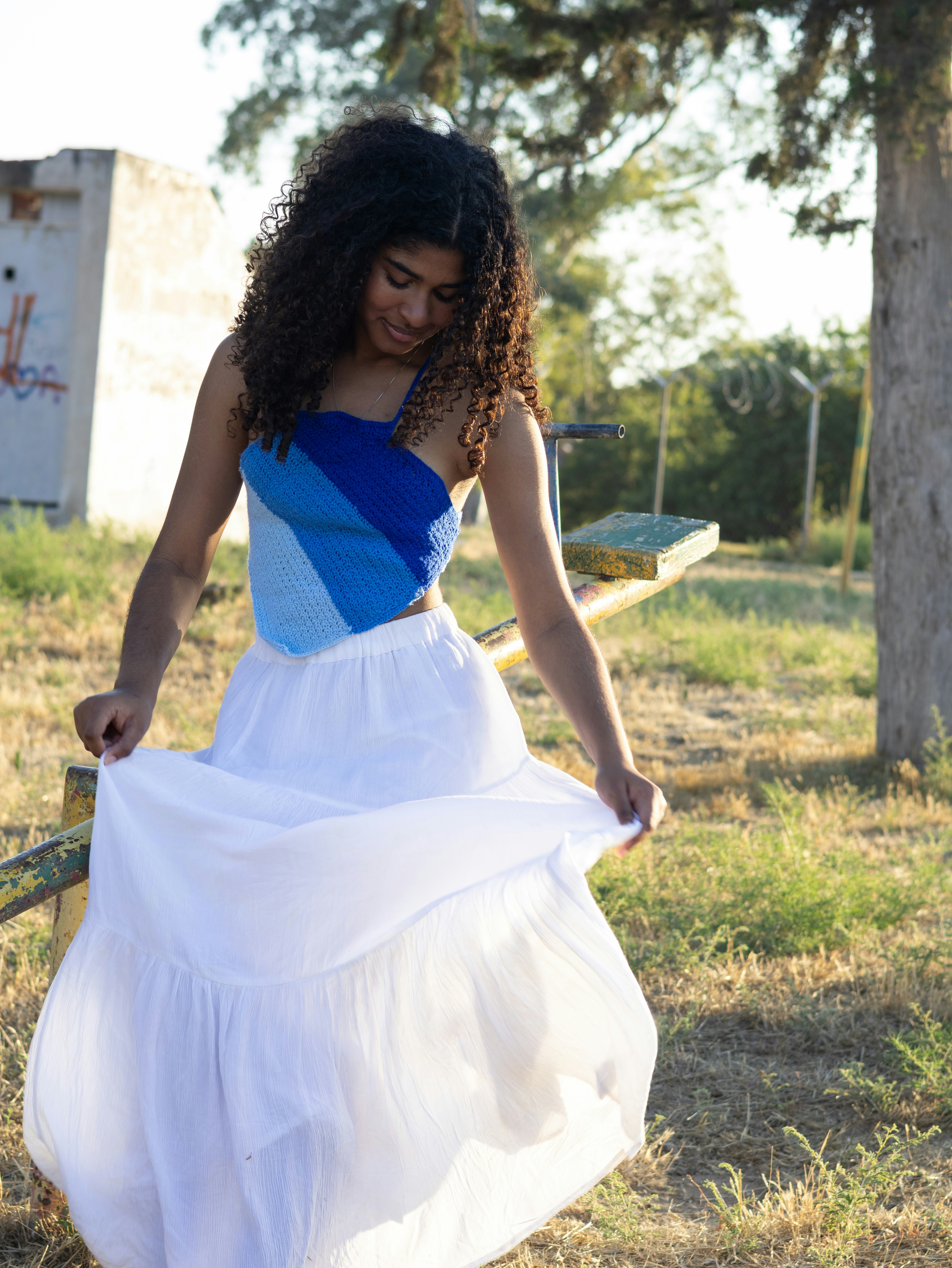 Blue-Patterned Top in a Sunlit Park Moment