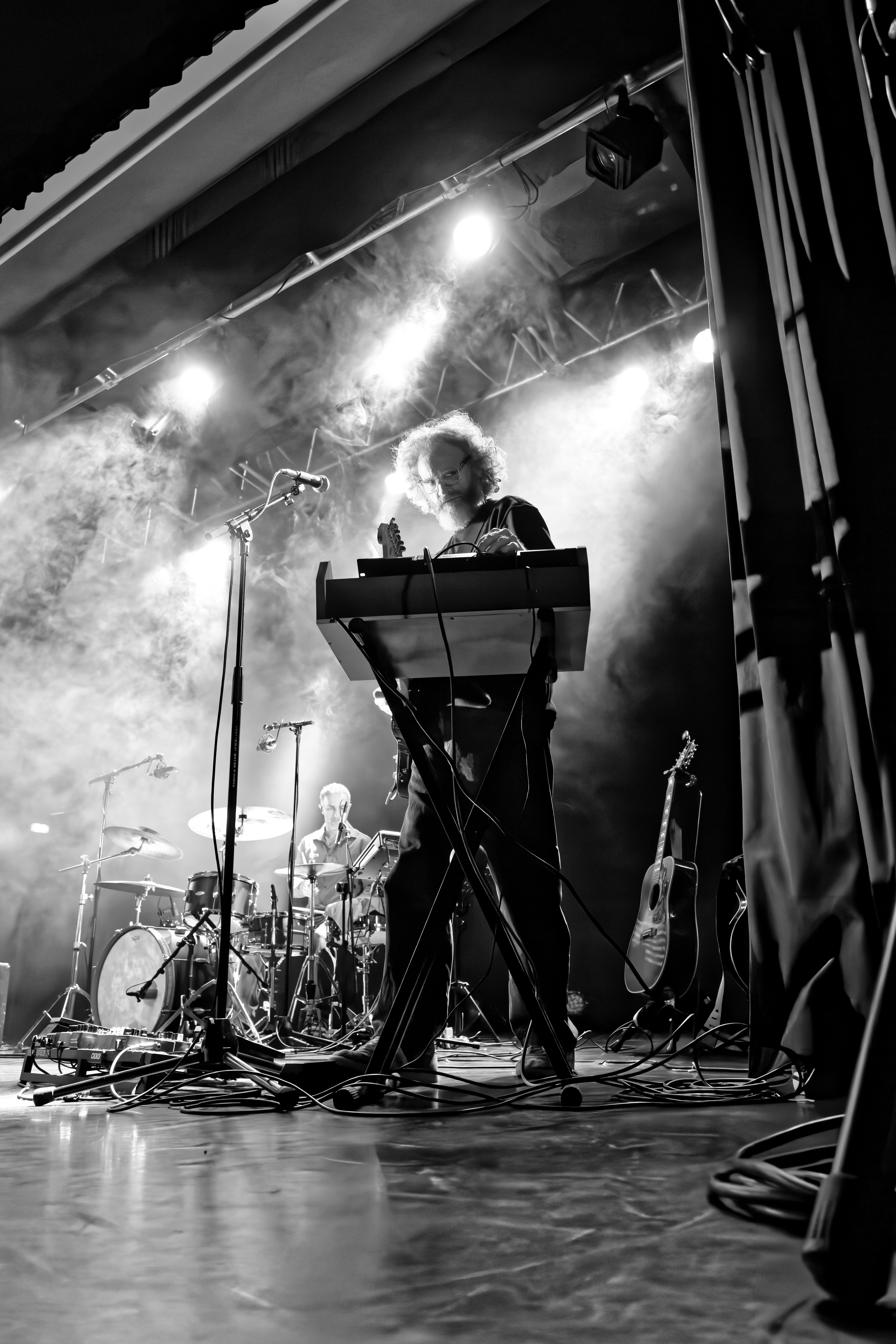 Center Stage: A Keyboardist Beneath Stage Lights