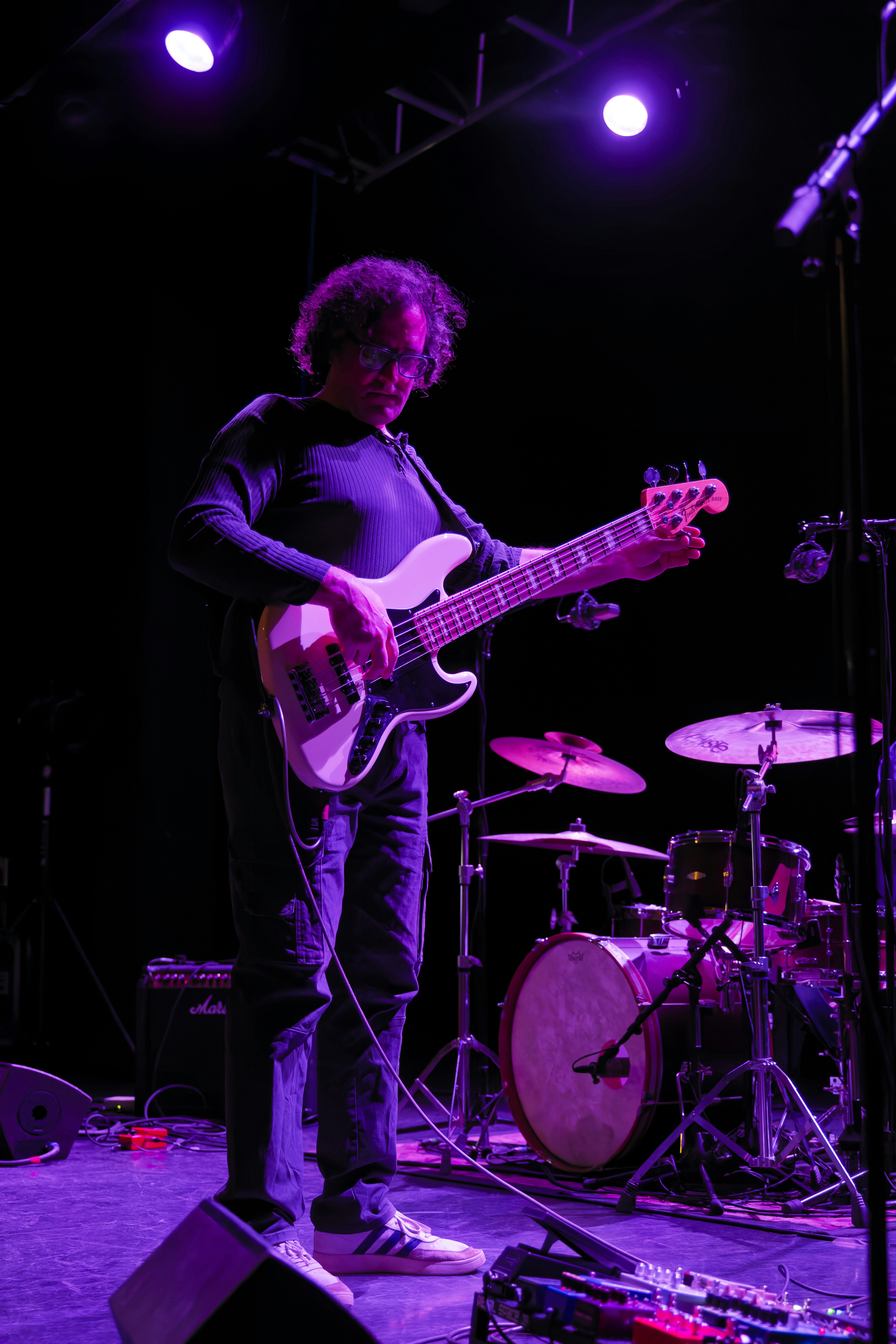 Basslines in Violet Light: A Live Portrait of a Jazz-Band Bassist