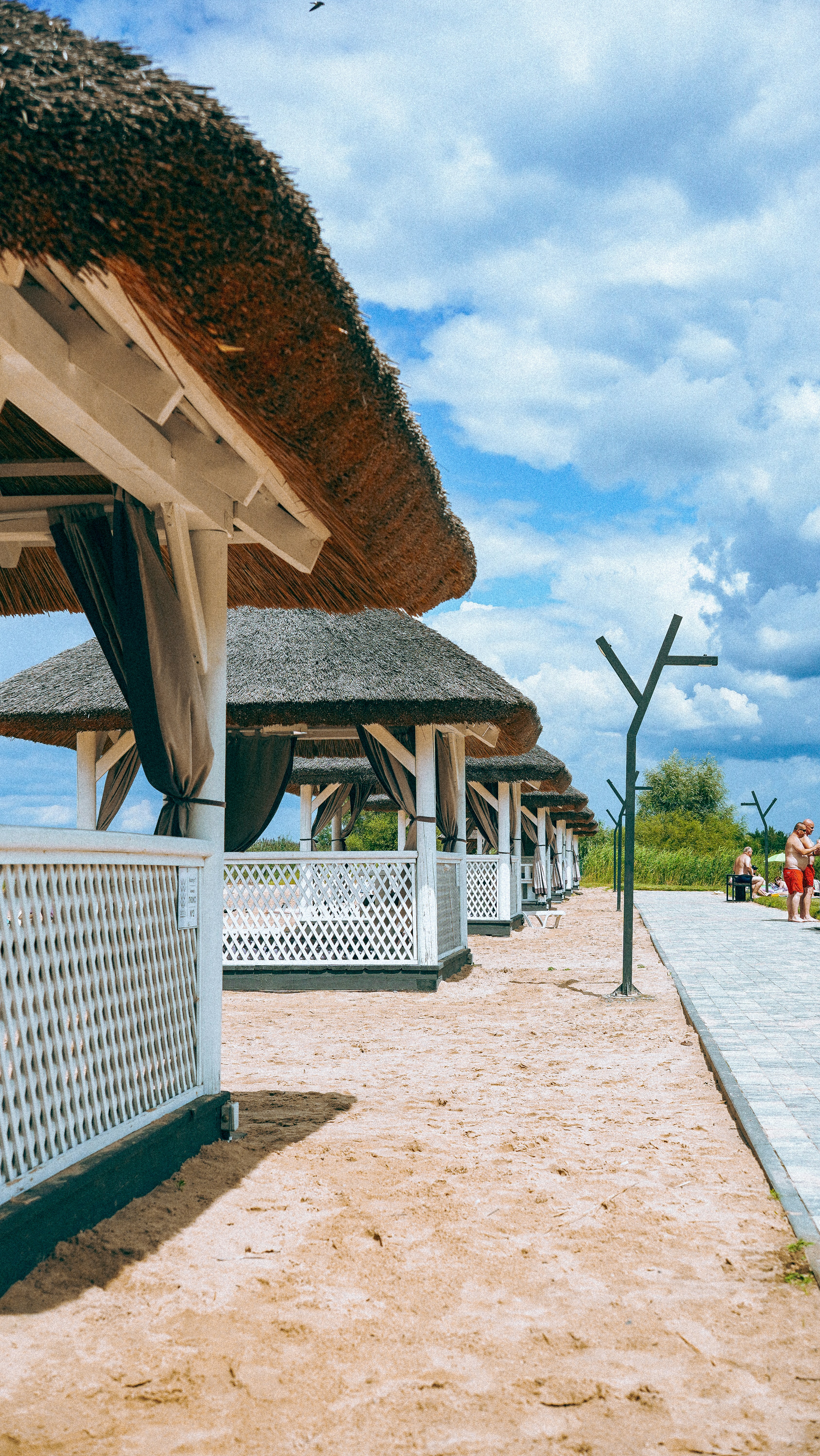 Shoreline Cabana Row on a Sunny Beach