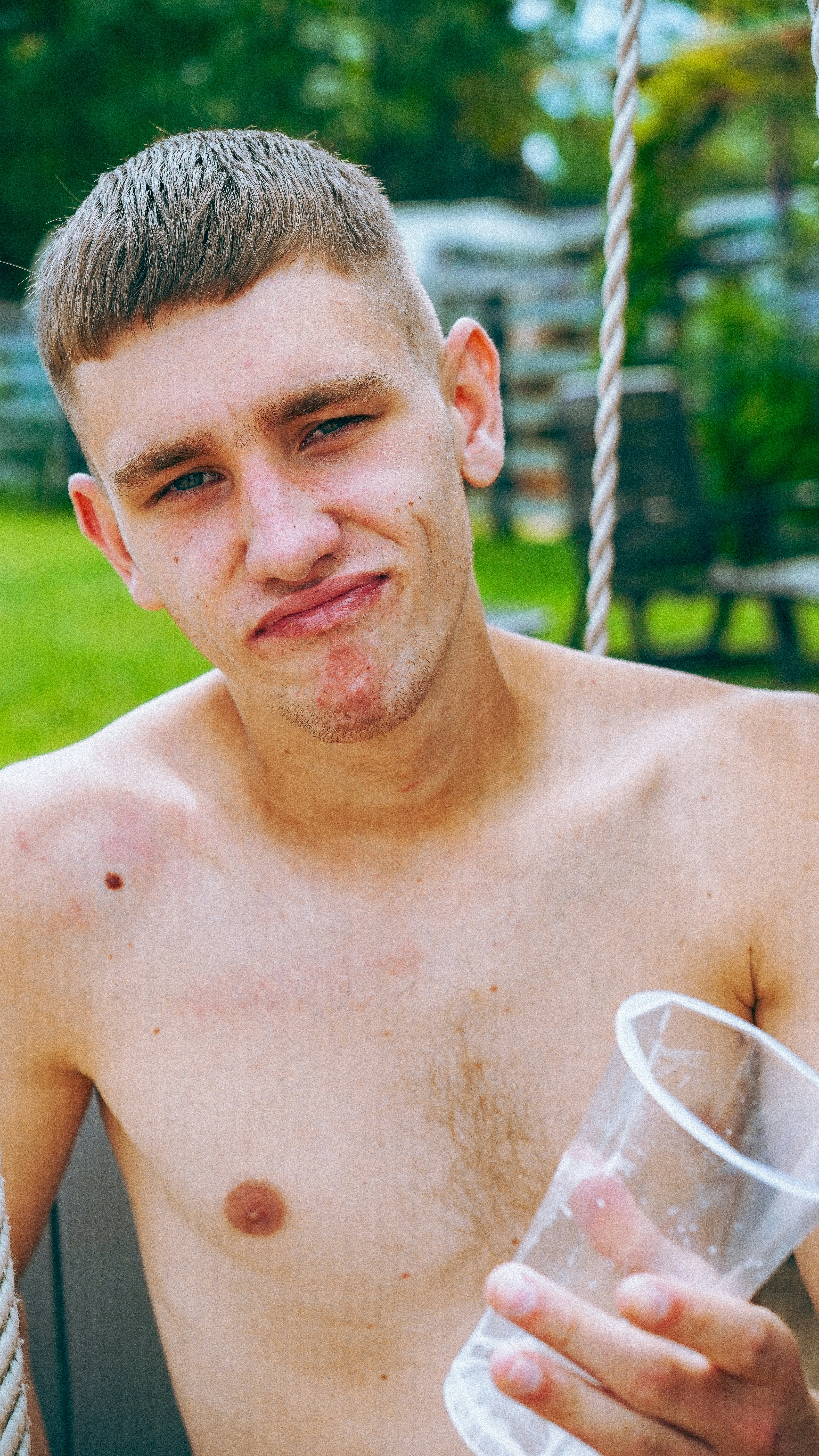 Glimpse of Mischief: a sunlit backyard portrait