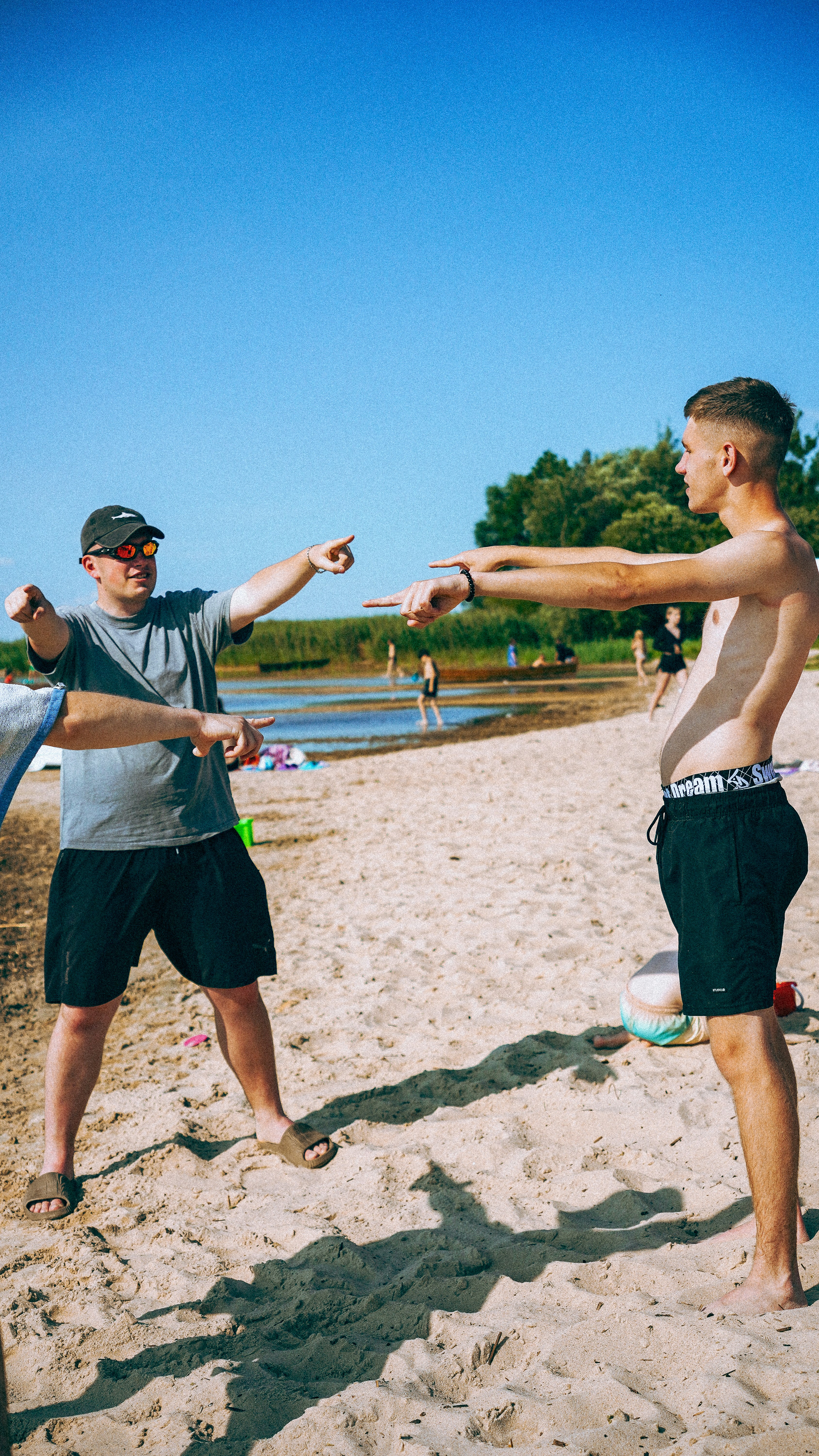 Beach Tug-of-Thing: a playful standoff on sunlit sand