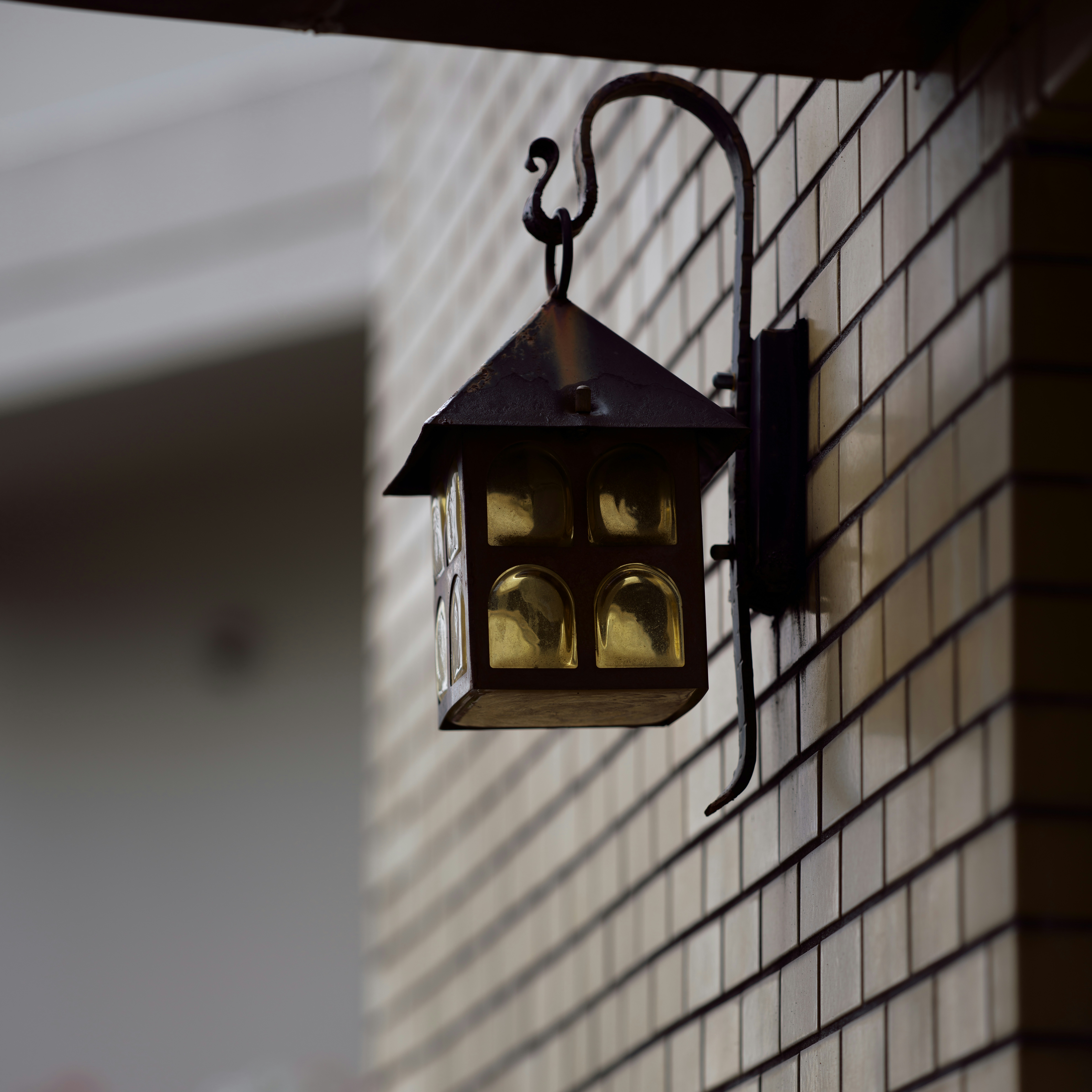Lantern Halo on a Brick Wall