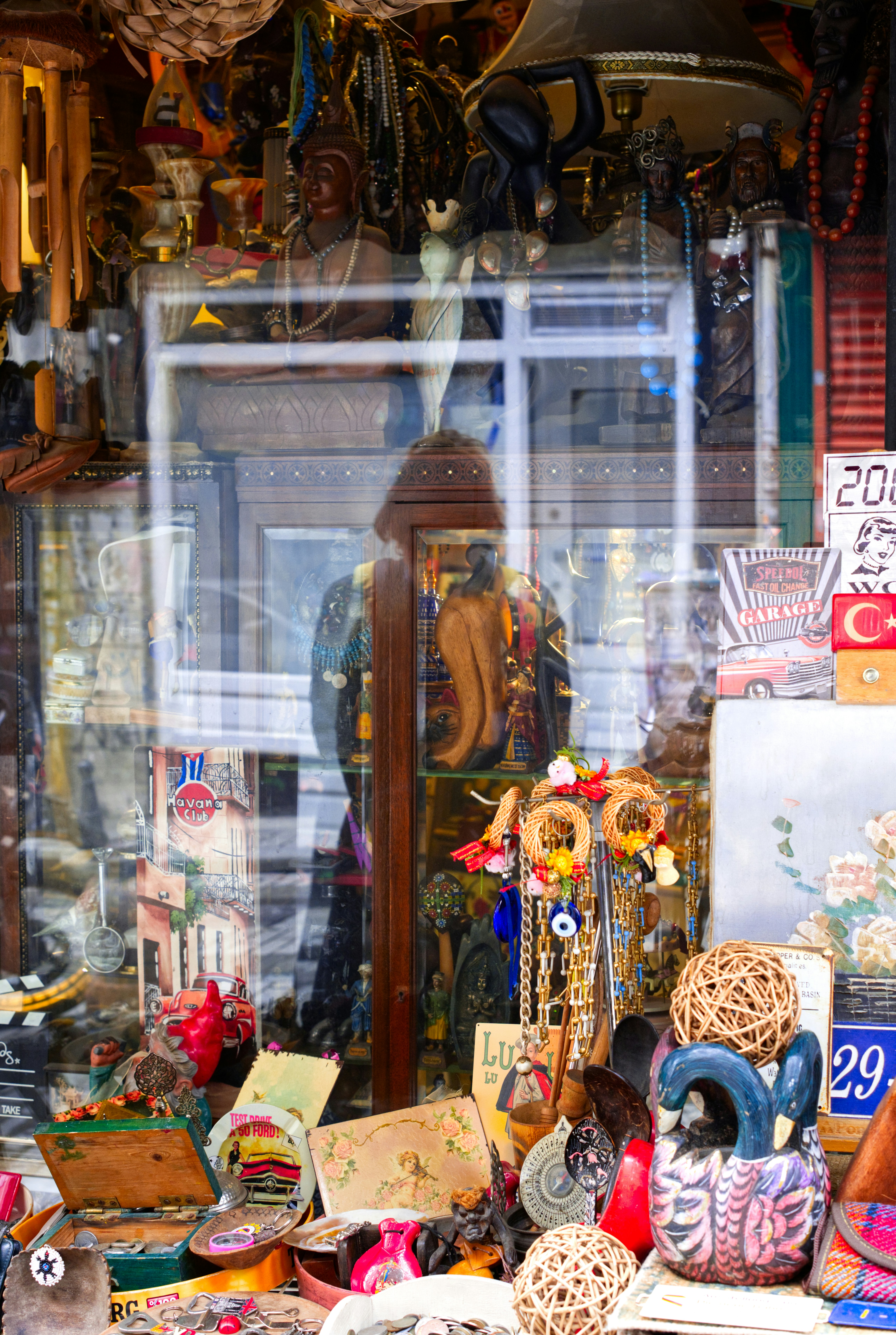 Shop Window Mosaic: Trinkets, Masks, and Reflections
