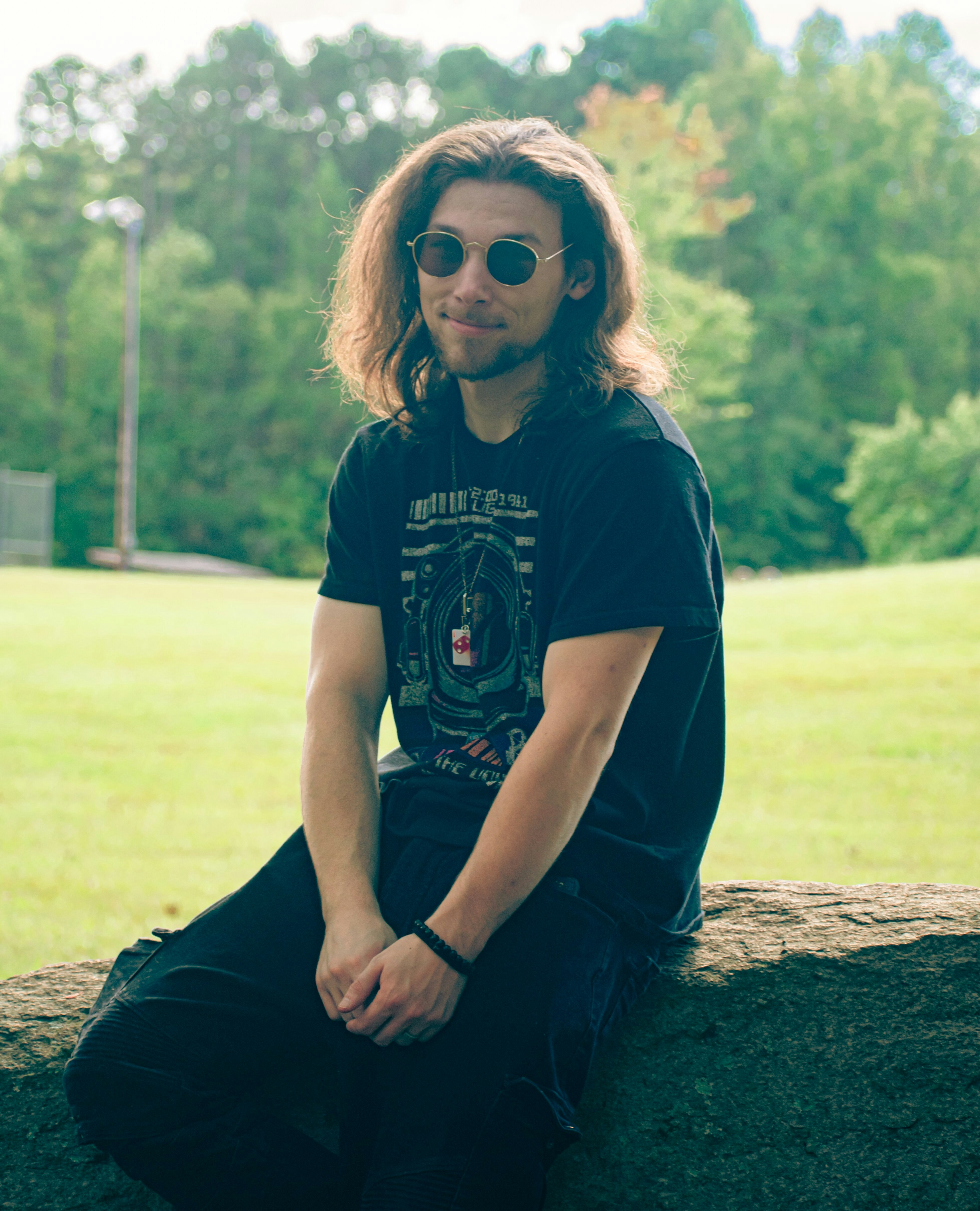 Casual Lean: Insights from a Sunlit Park Portrait