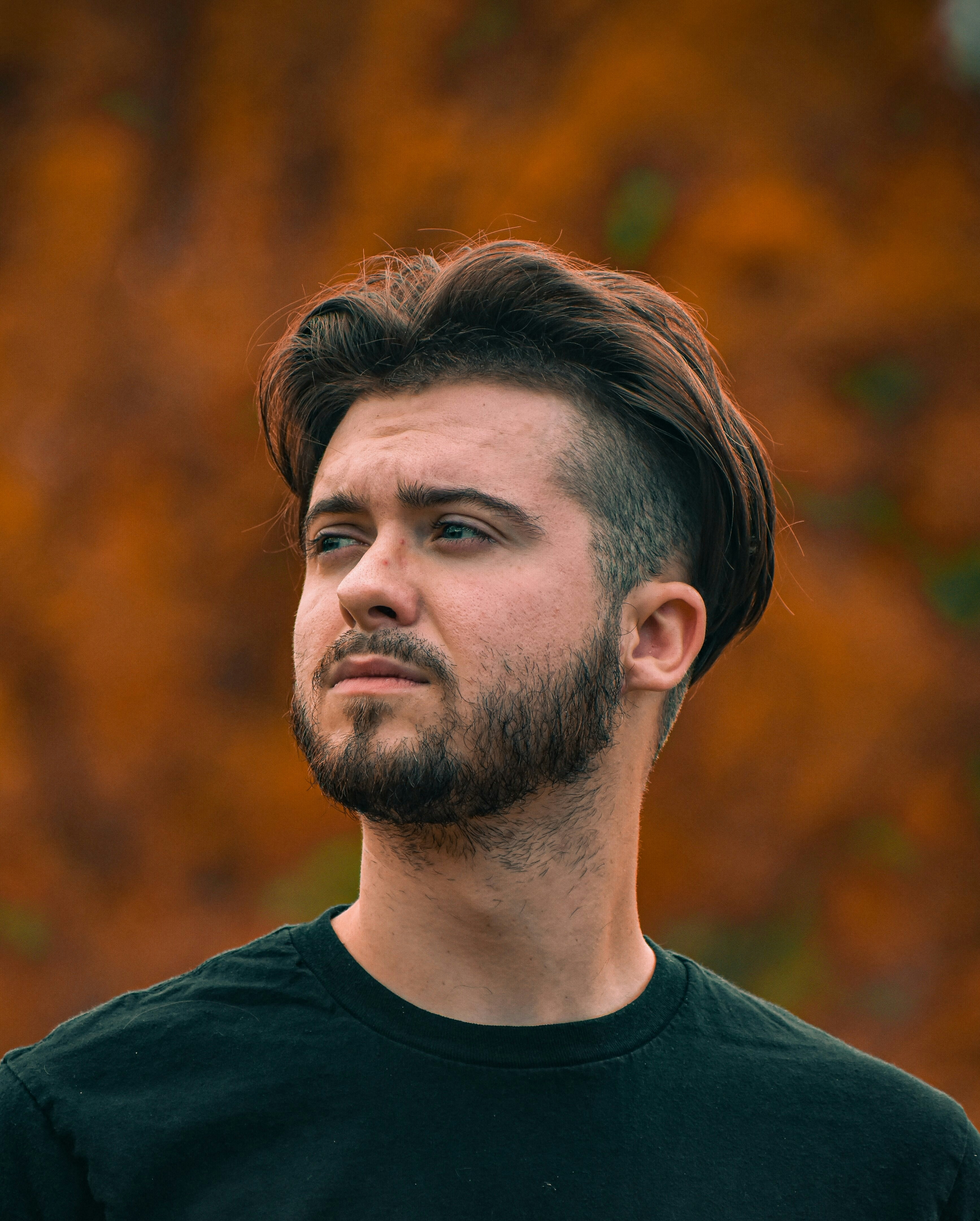 Contemplative Portrait Under Autumn Hues