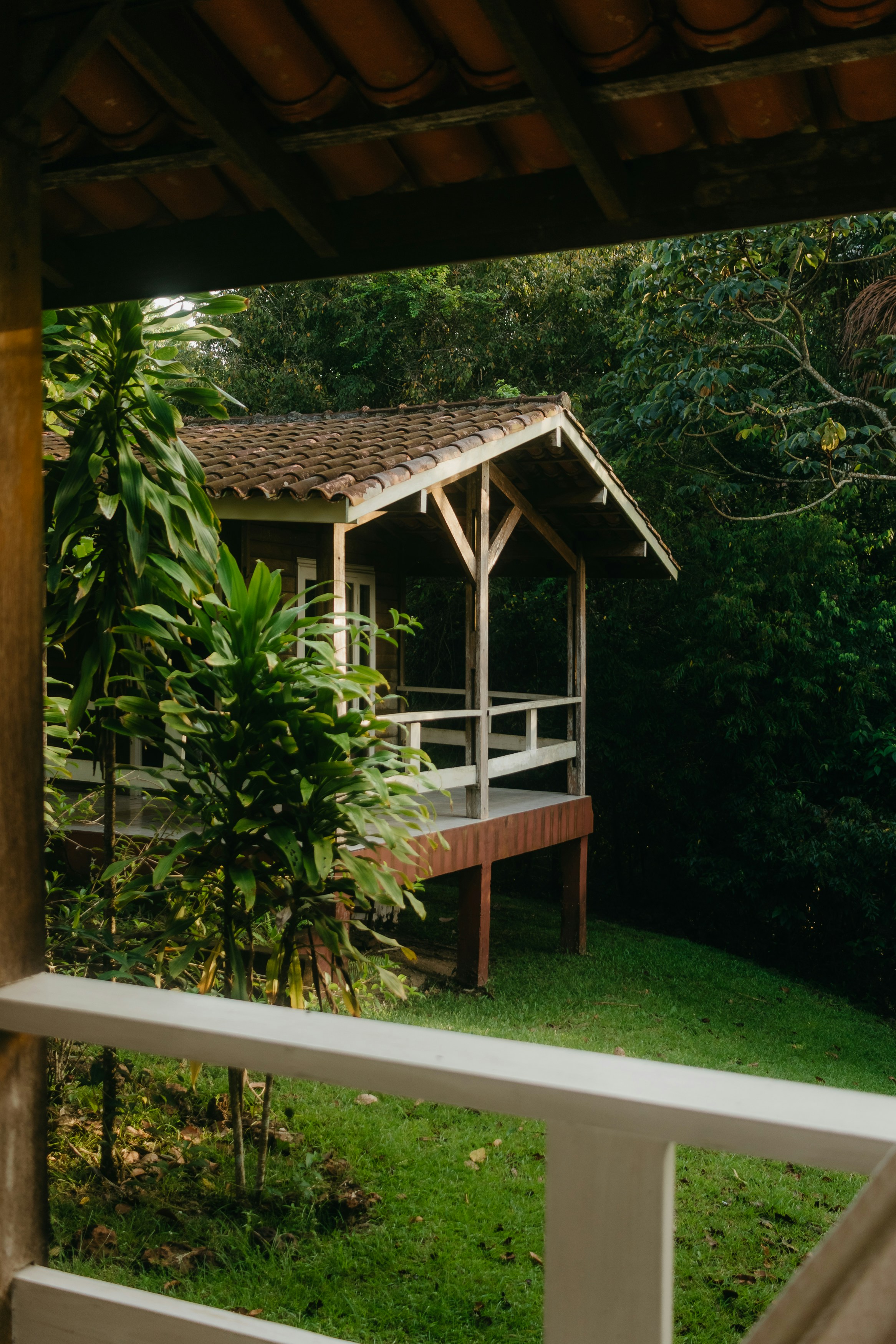 Terraced veranda retreat nestled in tropical greenery
