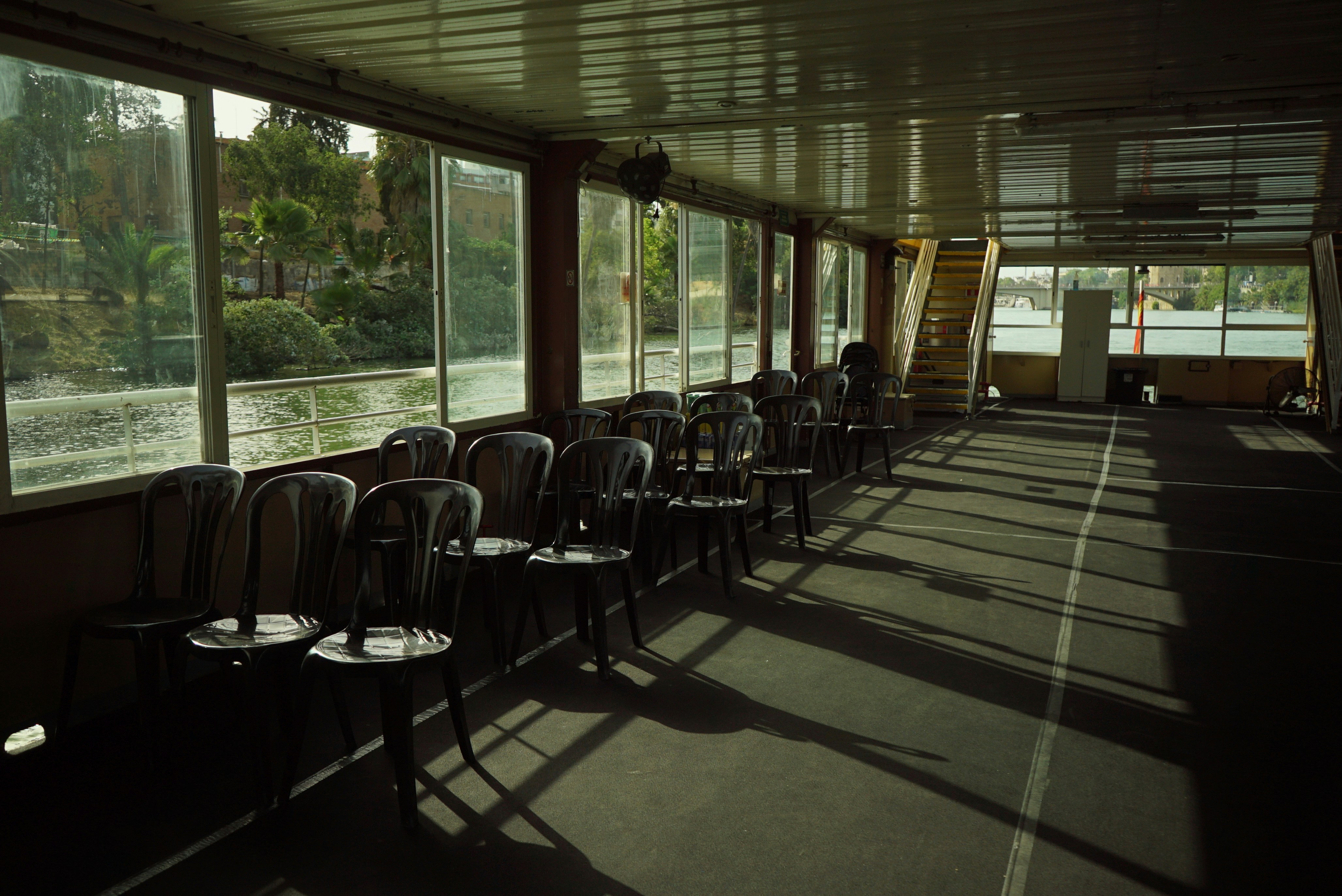 Vacant Bleachers in an Afternoon Sunlit Lounge