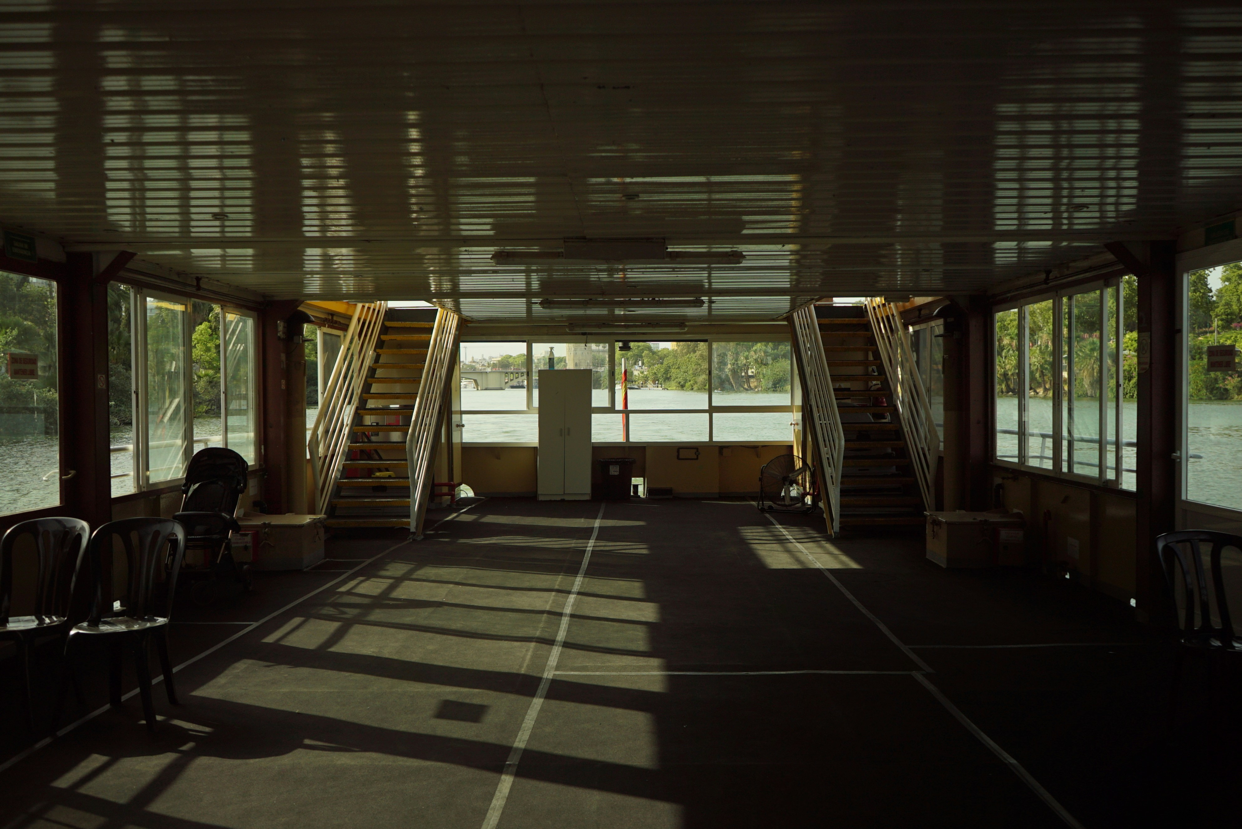 Deserted Ferry Terminal: Afternoon Light over Empty Platforms