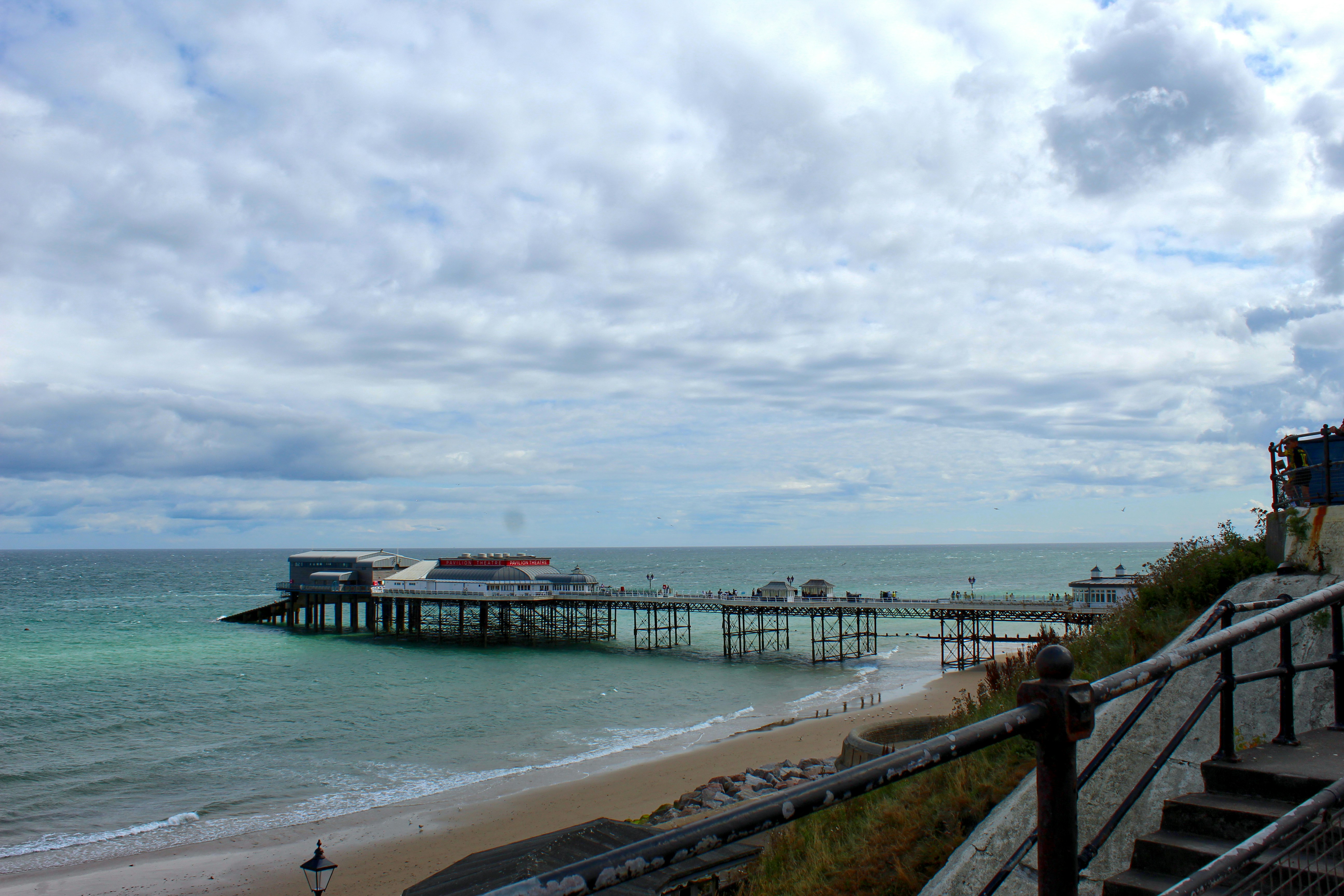 Pier at Sea Gate: A Quiet Coastline Under Broad Skies