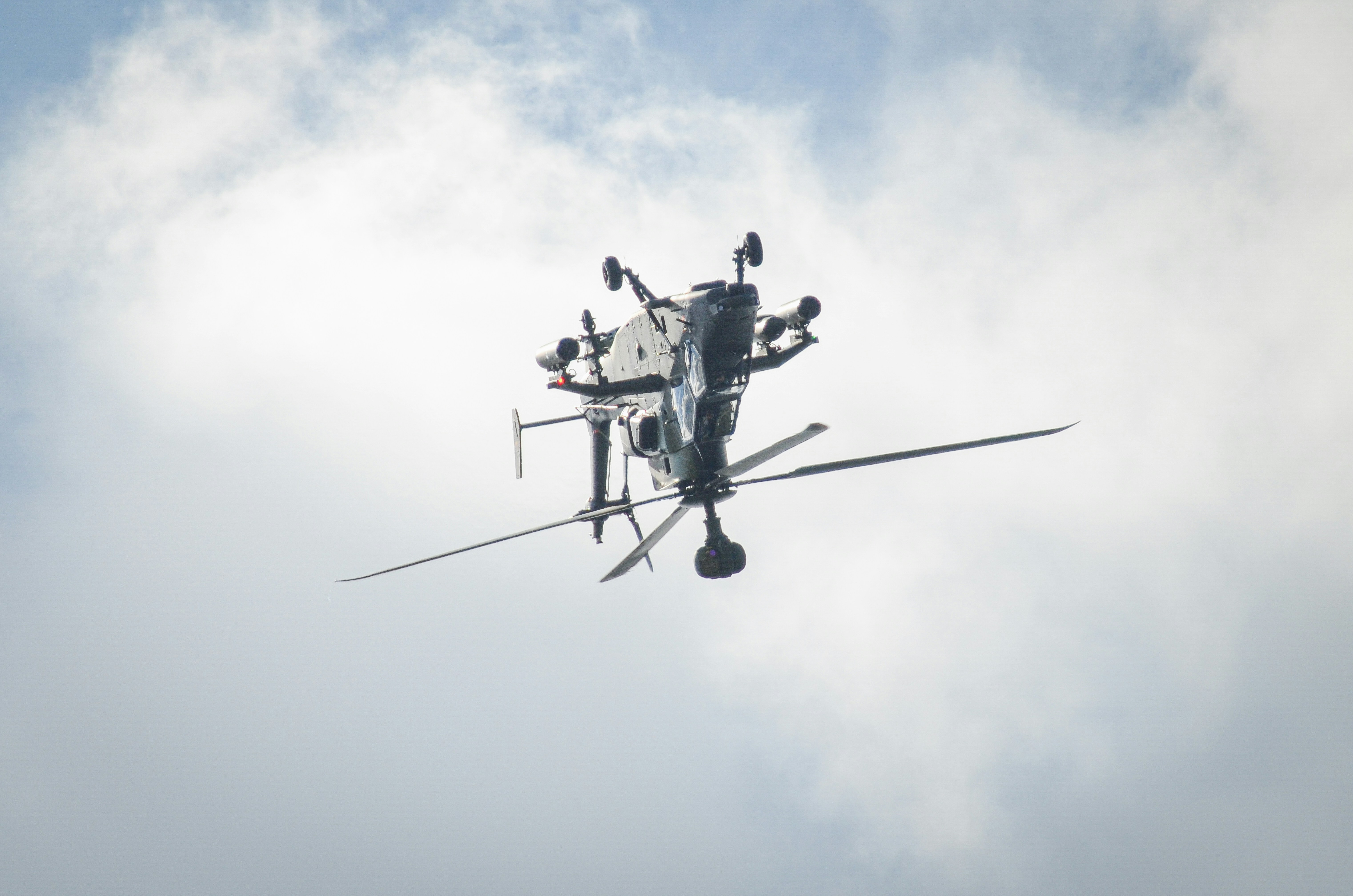 Midair Mechanic: Precision Drone-Heli in Flight