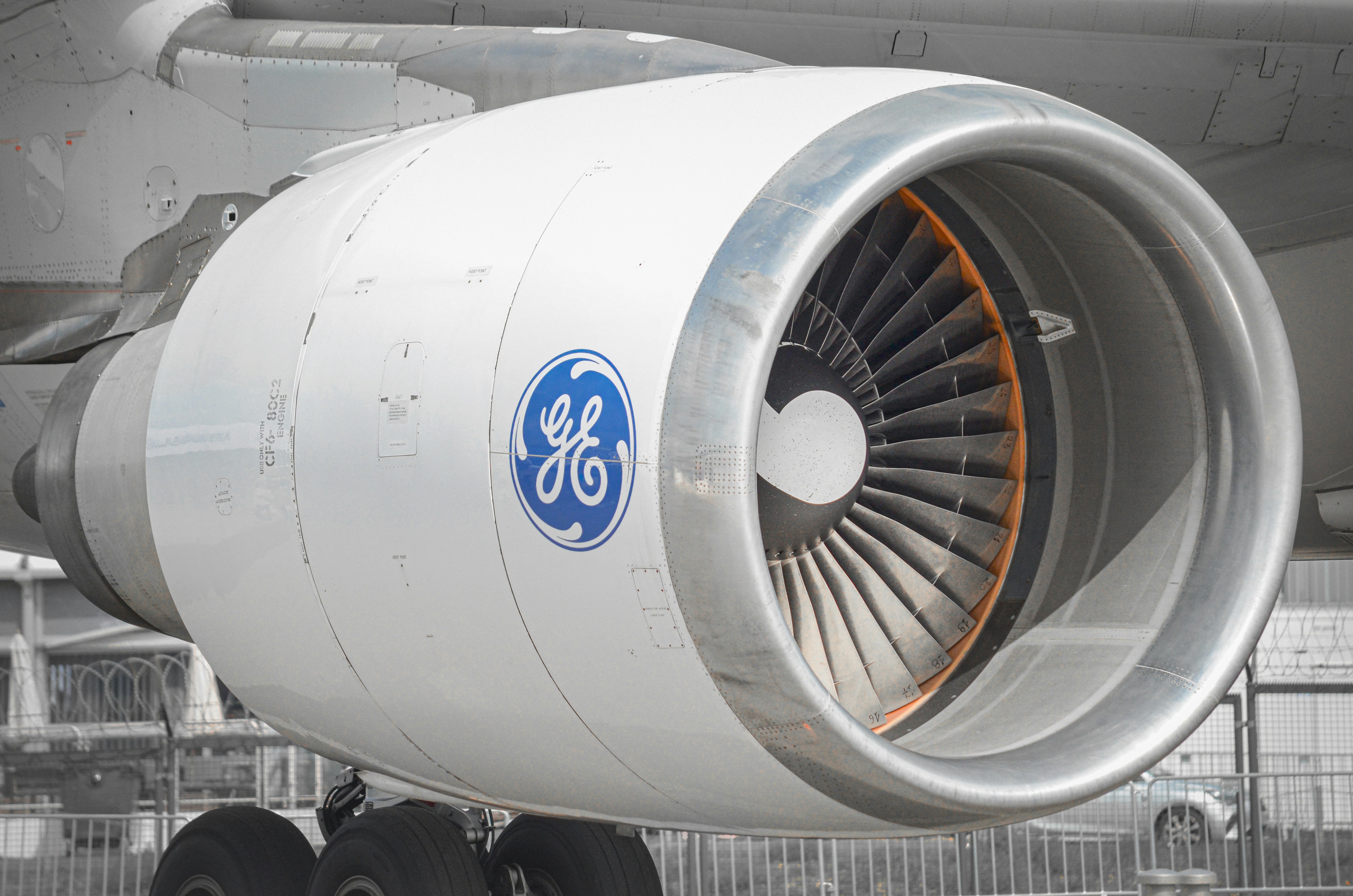 GE Engine Cowl: A close-up of turbine inlet with branding and intake detail