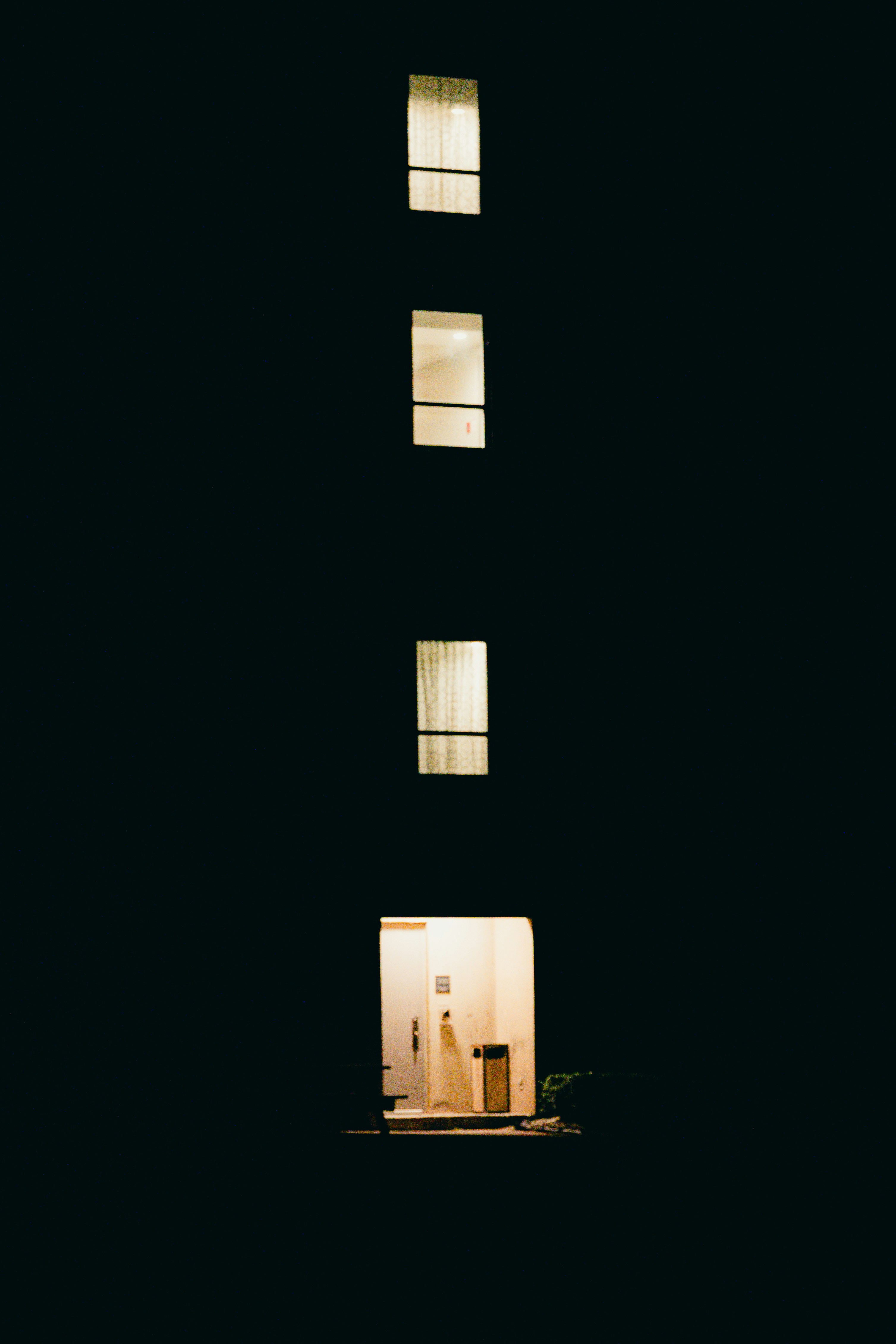 Luminous Dormers: Nighttime Facade Through a Narrow Aperture