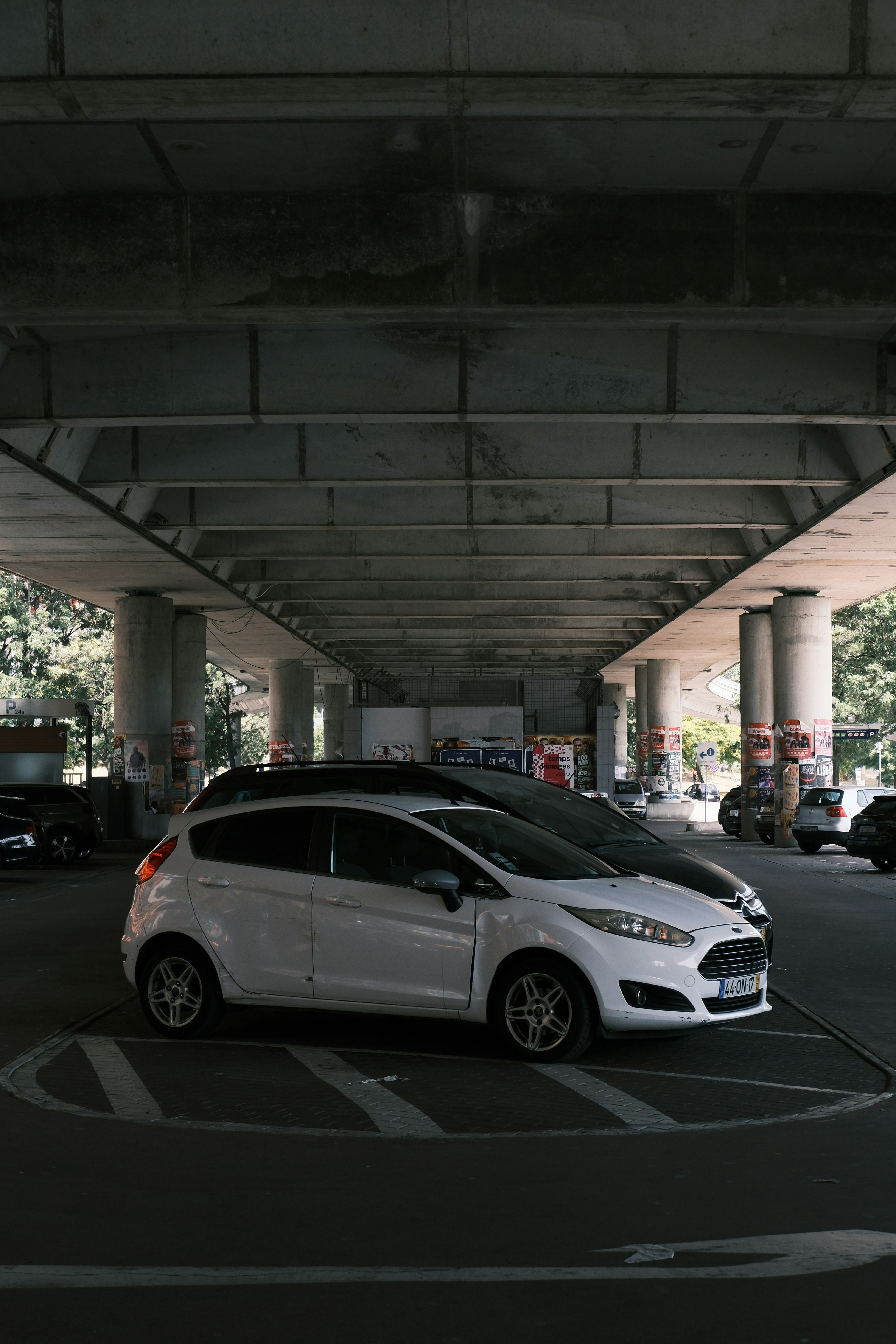 White Hatch in a Concrete Parking Underpass