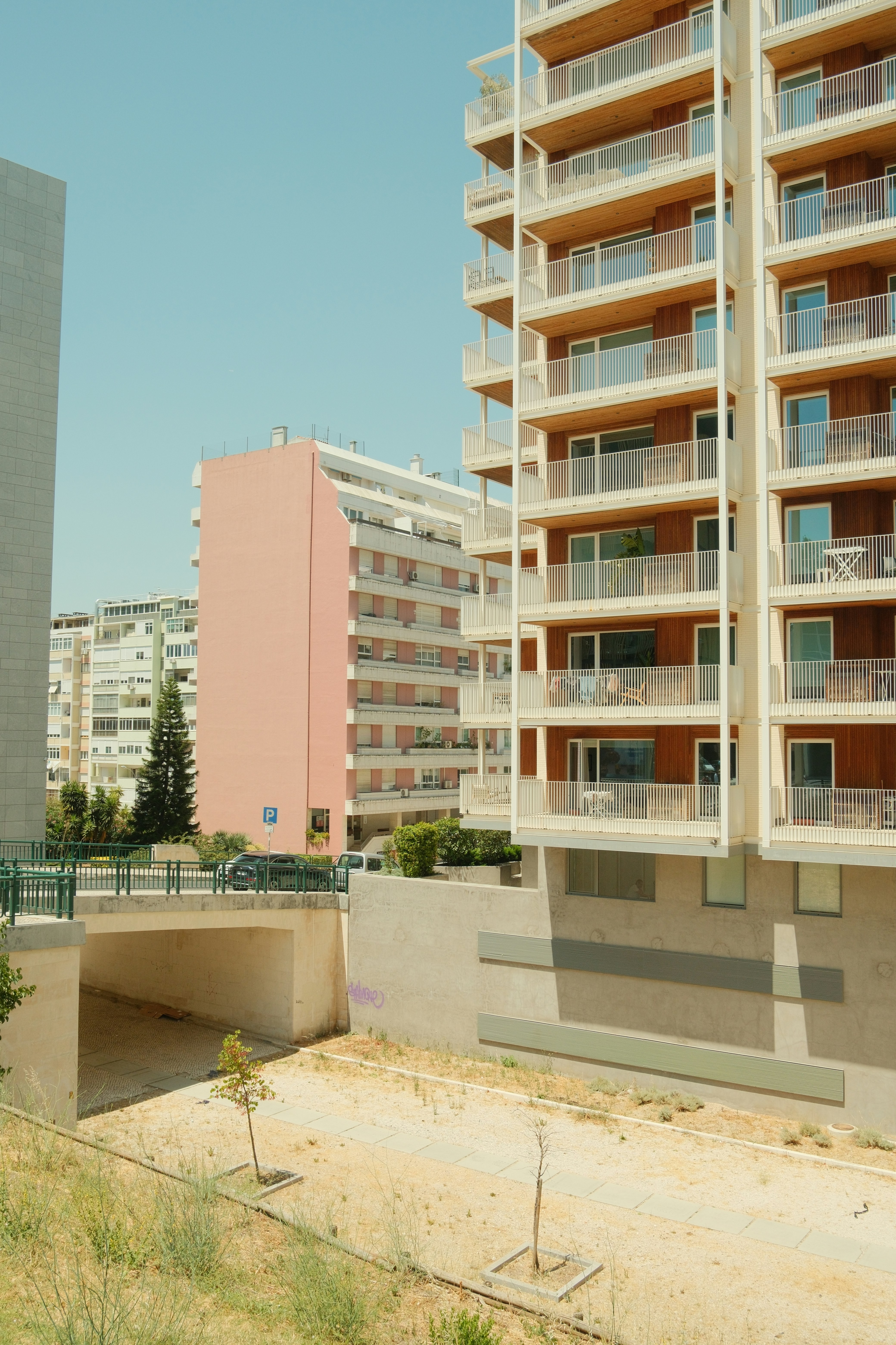 Balconies and Sunlit Geometry Above the Street