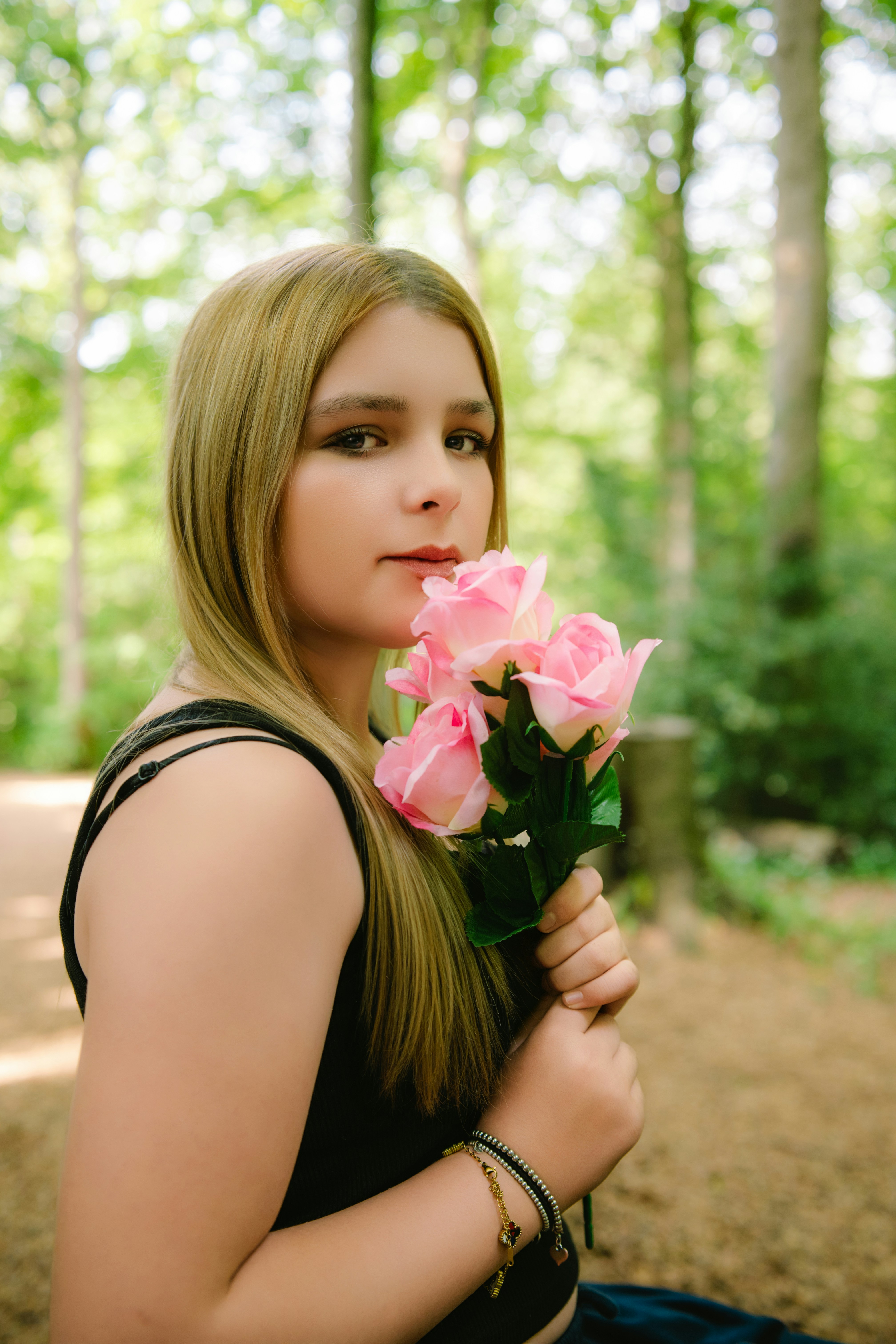 Soft Bloom: A Portrait in a Sunlit Forest