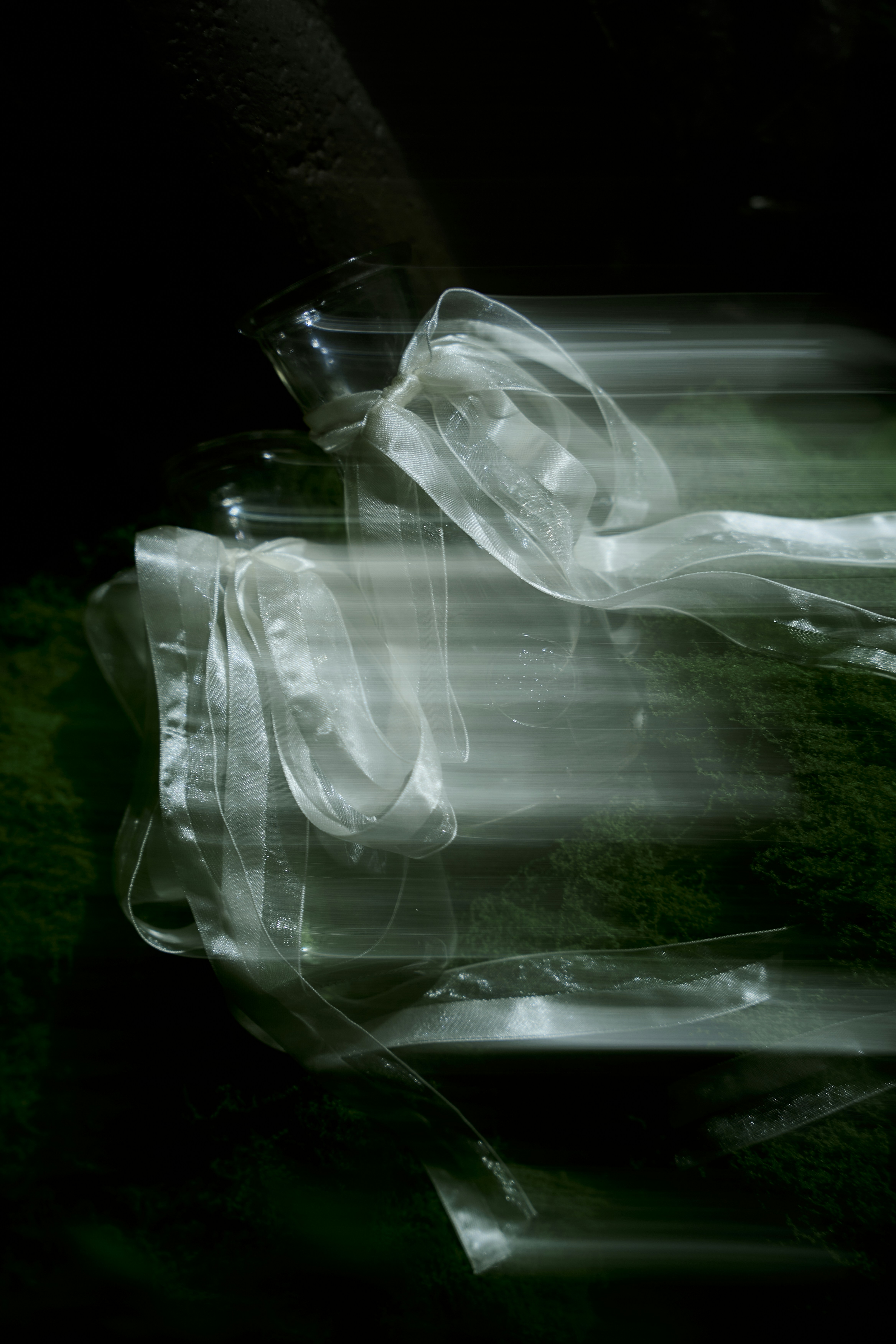 Whispering Ribbon: Motion frozen in a veil of glass