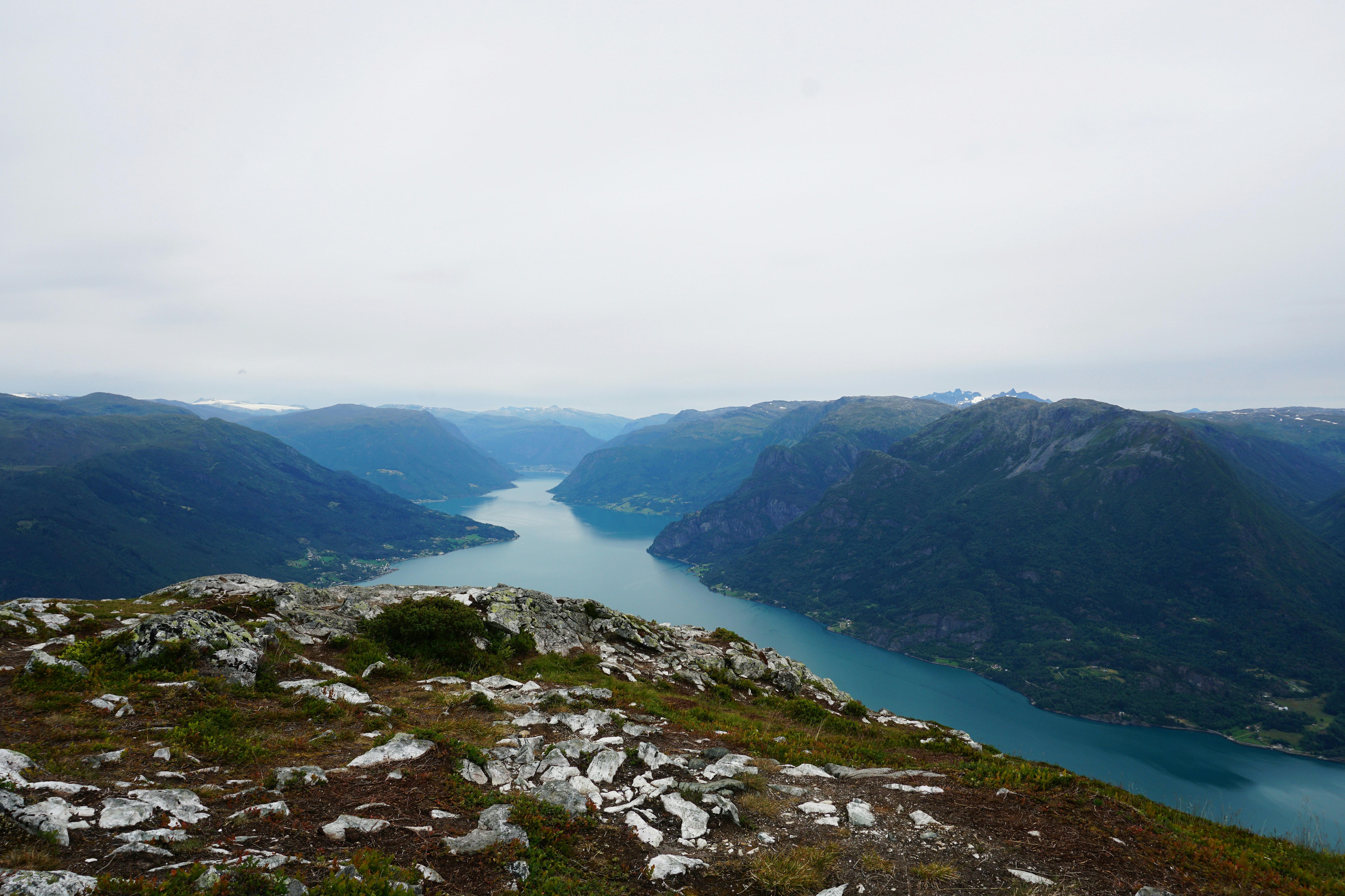 Aerial Fjord Vista: Granite Ridge Overlooking Blue Inlet