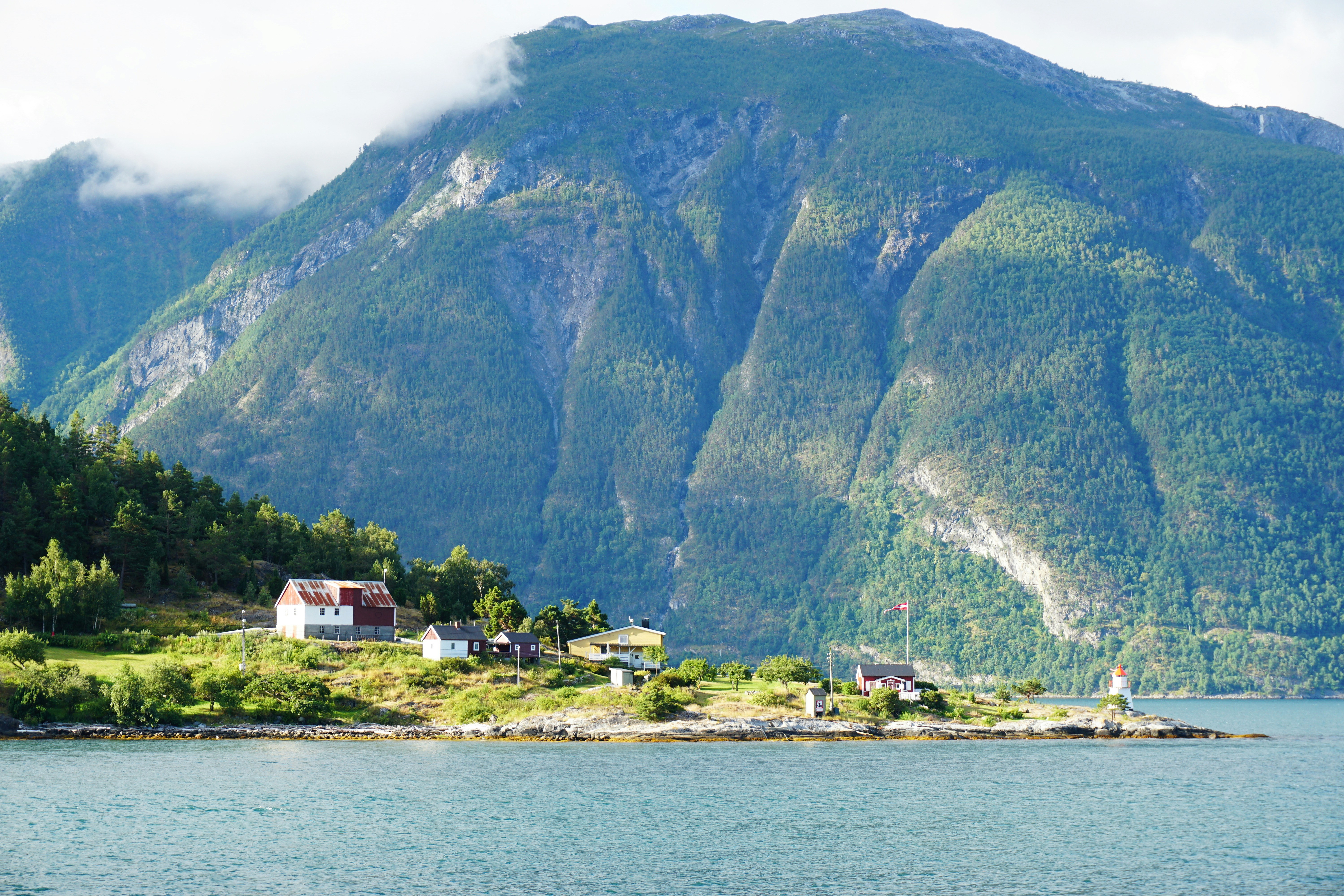 Harbor Village Nestled at the Base of Towering Fjells
