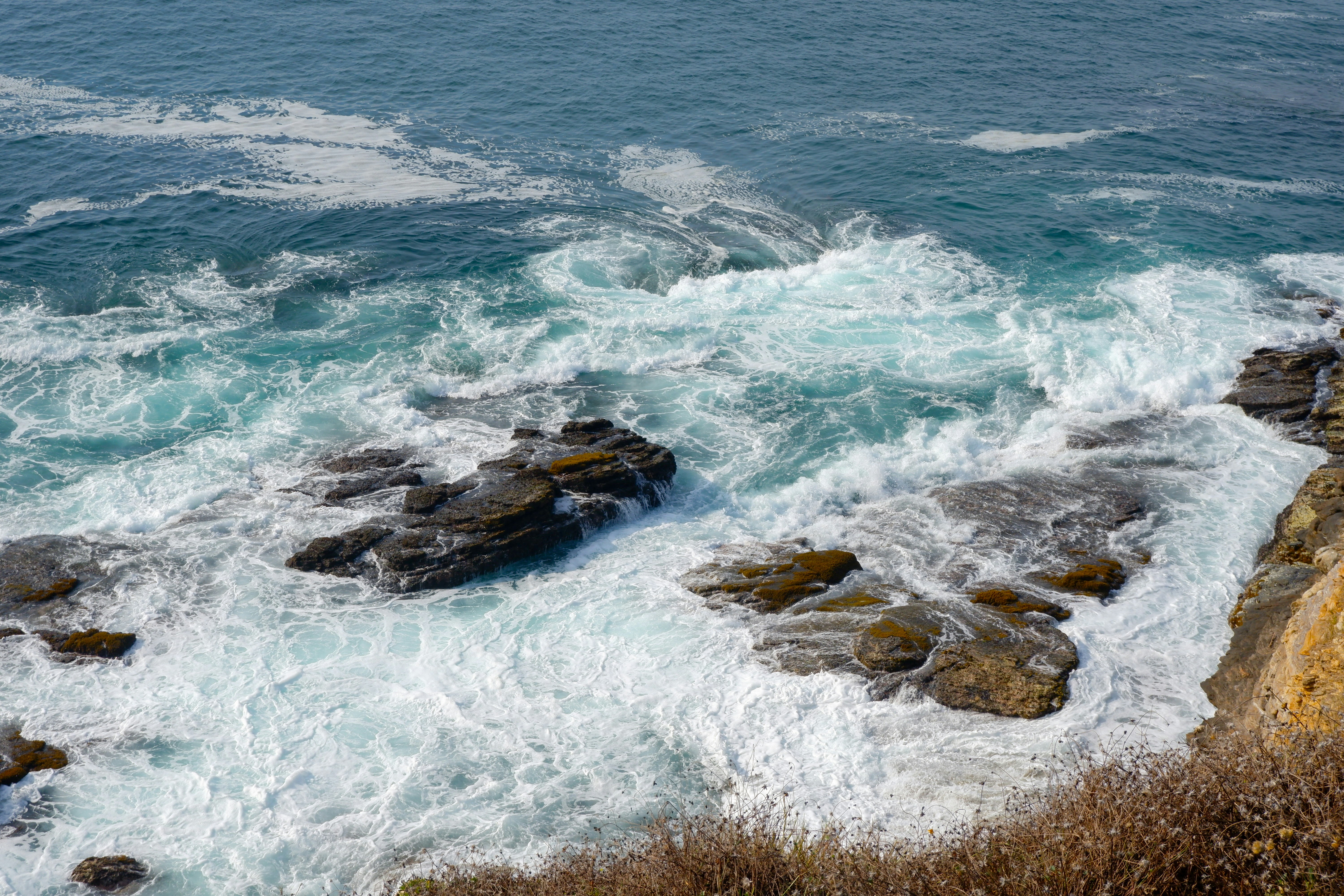 Foamy Line at the Cliff Edge