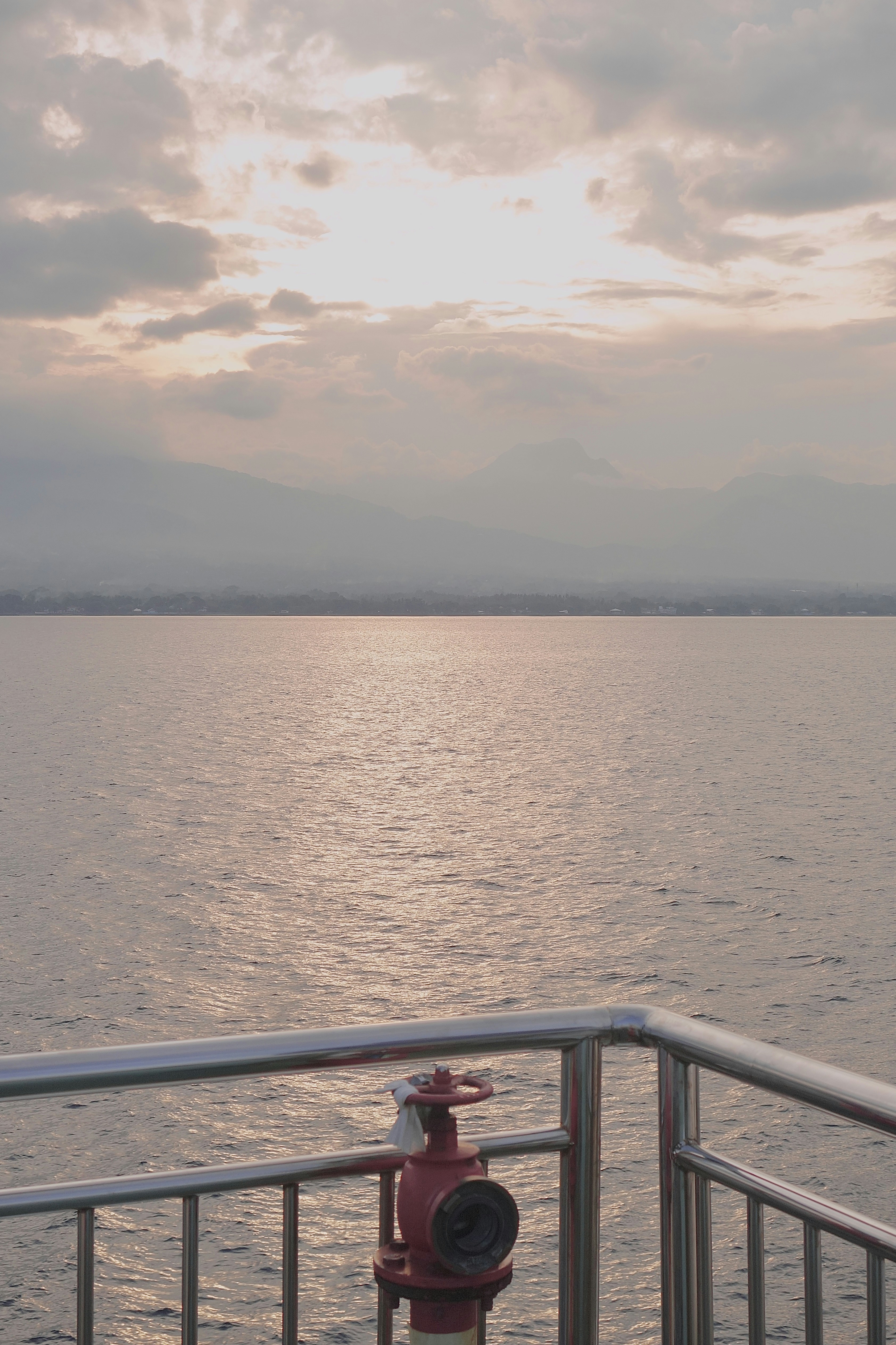 Sunlit Harbor Promise from a Red Railship