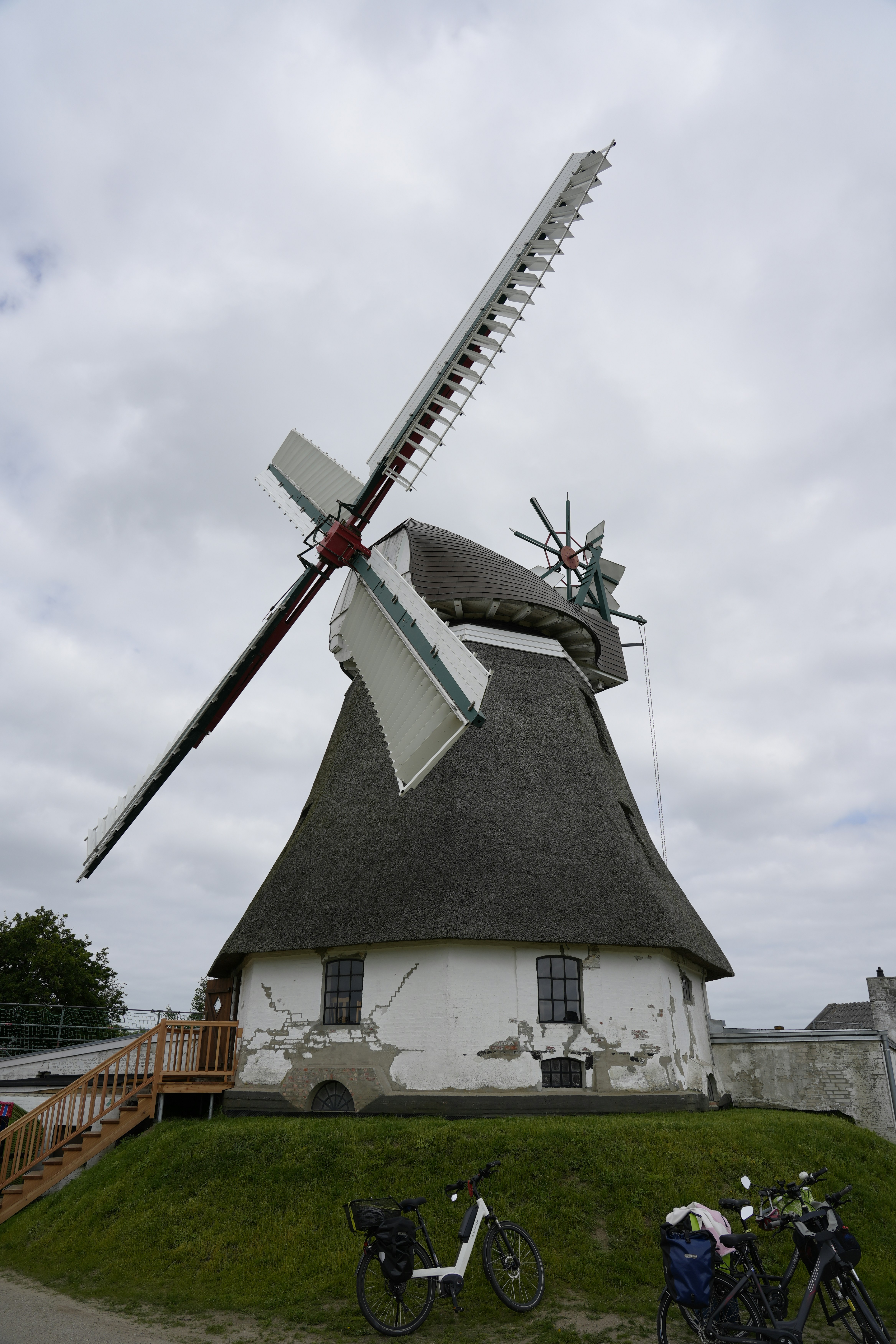 Windmill Sentinel under a Courtesy of Clouds